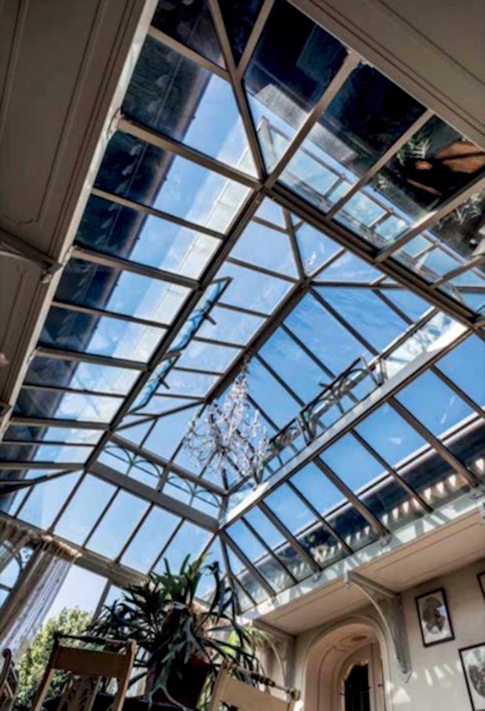Custom Sloped Glass Roof Atrium Courtyard By Gozzi Design Realization And Partners Architizer