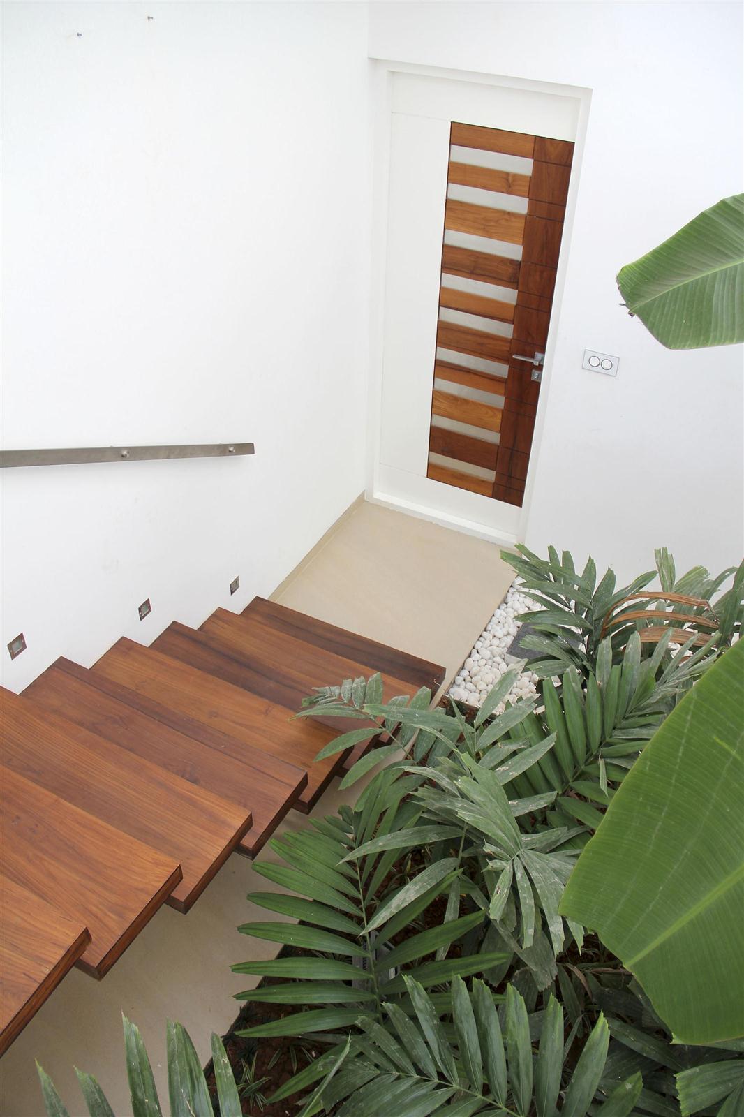 The Running Wall Residence by LIJO RENY ARCHITECTS - Architizer