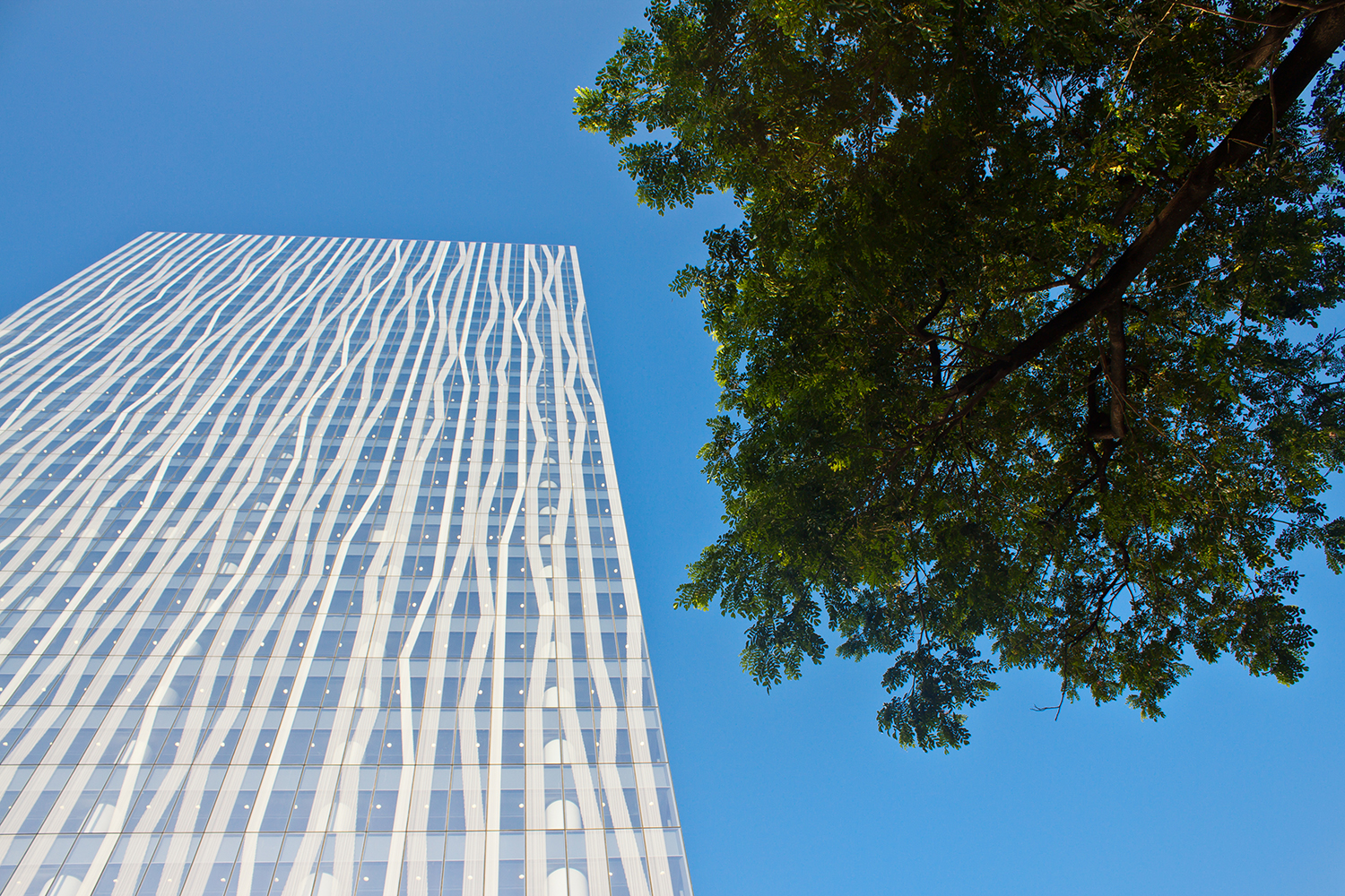The Zuellig Building by Skidmore, Owings & Merrill (SOM) - Architizer