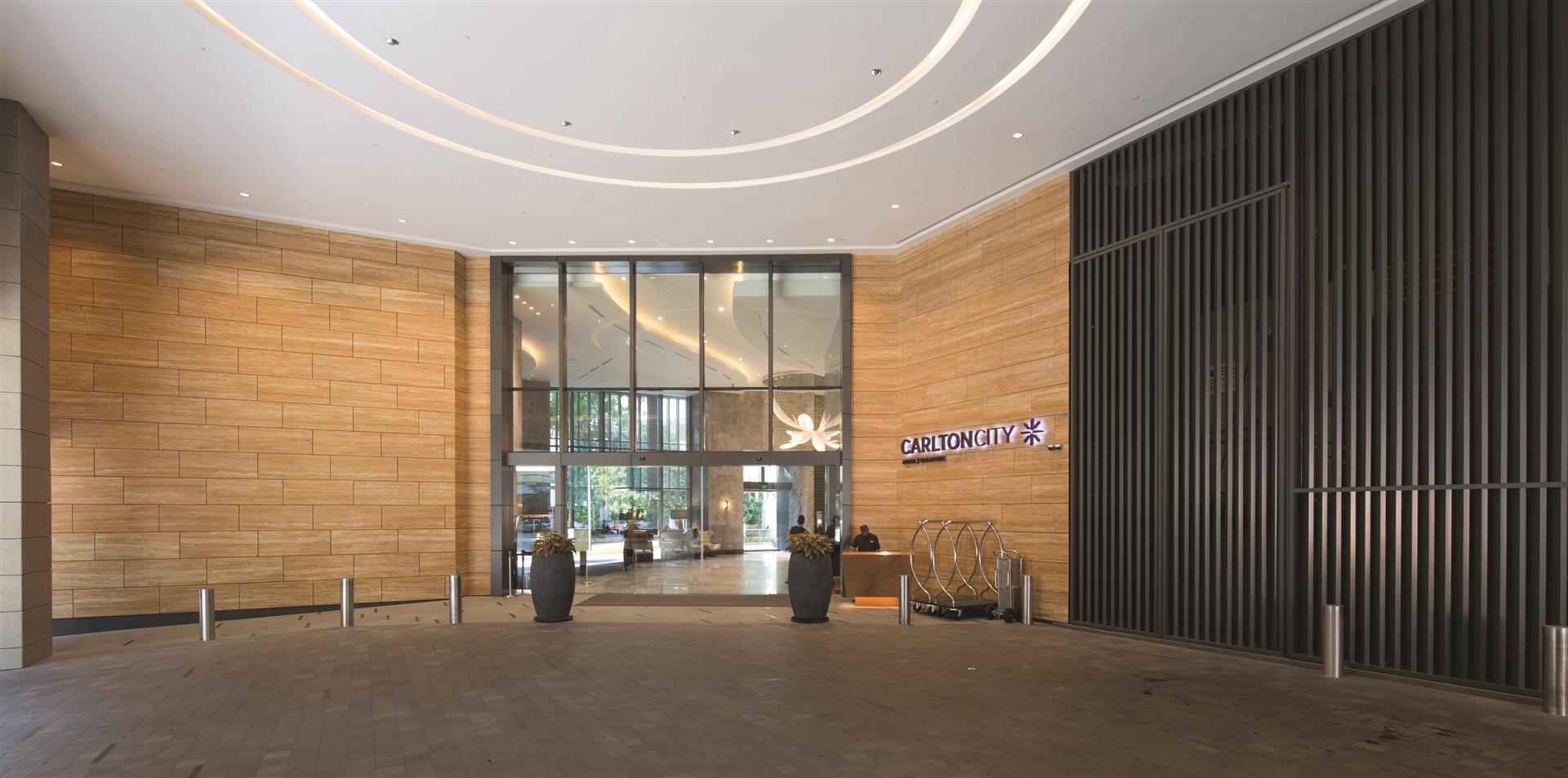 Carlton City Hotel: An Enduring Expression of Elegance by DP Architects ...