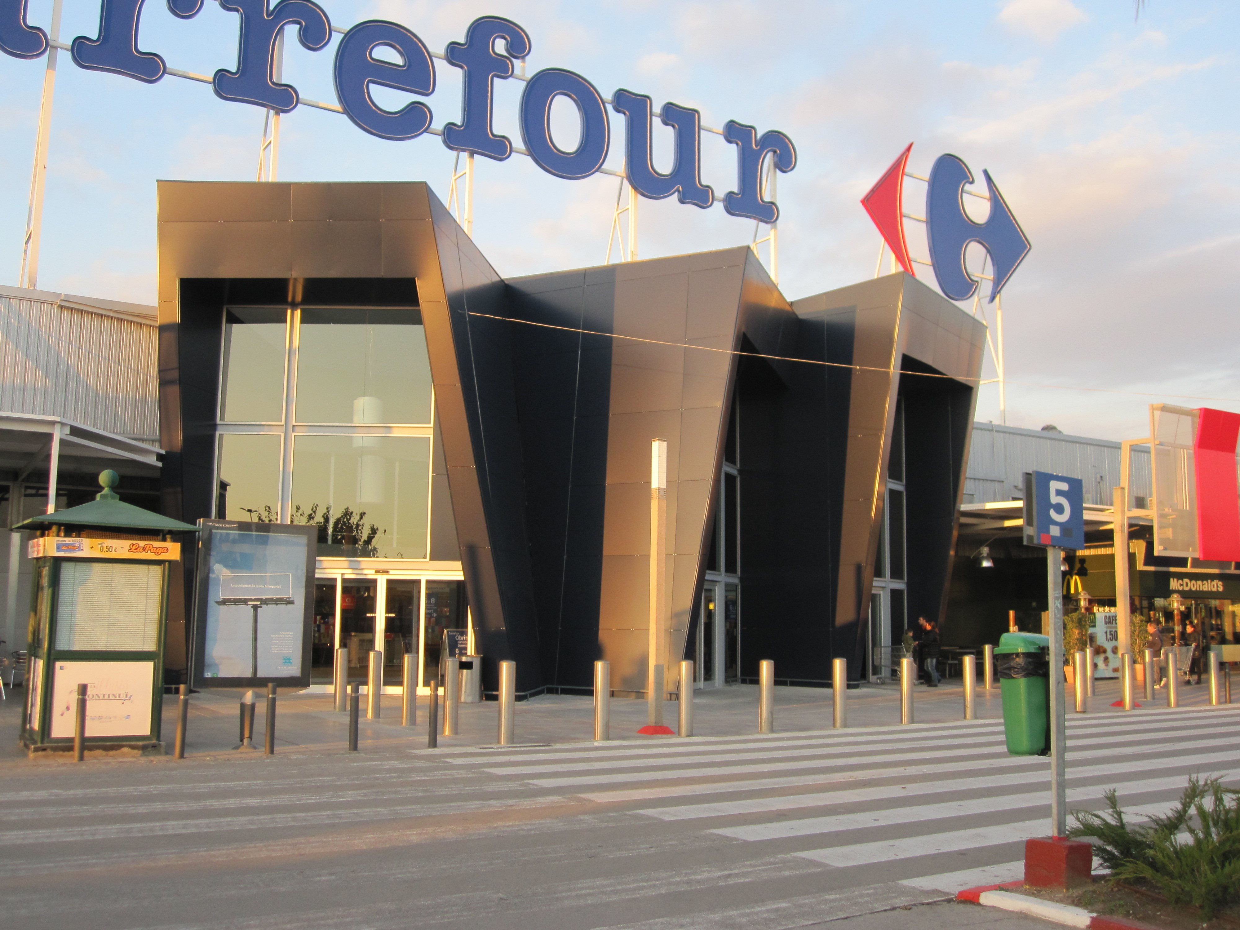 Main Entrance in Shopping Mall by Cimbra Arquitectos - Architizer