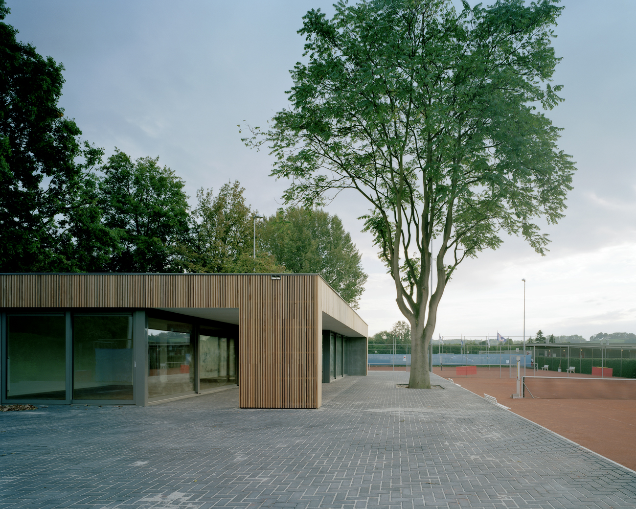 Kimbria tennis club house by Jo Janssen Architecten - Architizer