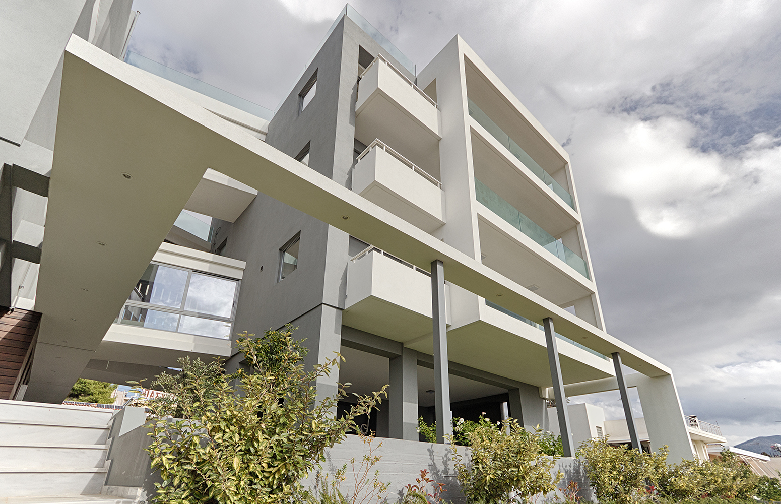 Apartment Building in Alimos by OFFICETWENTYFIVEARCHITECTS - Architizer