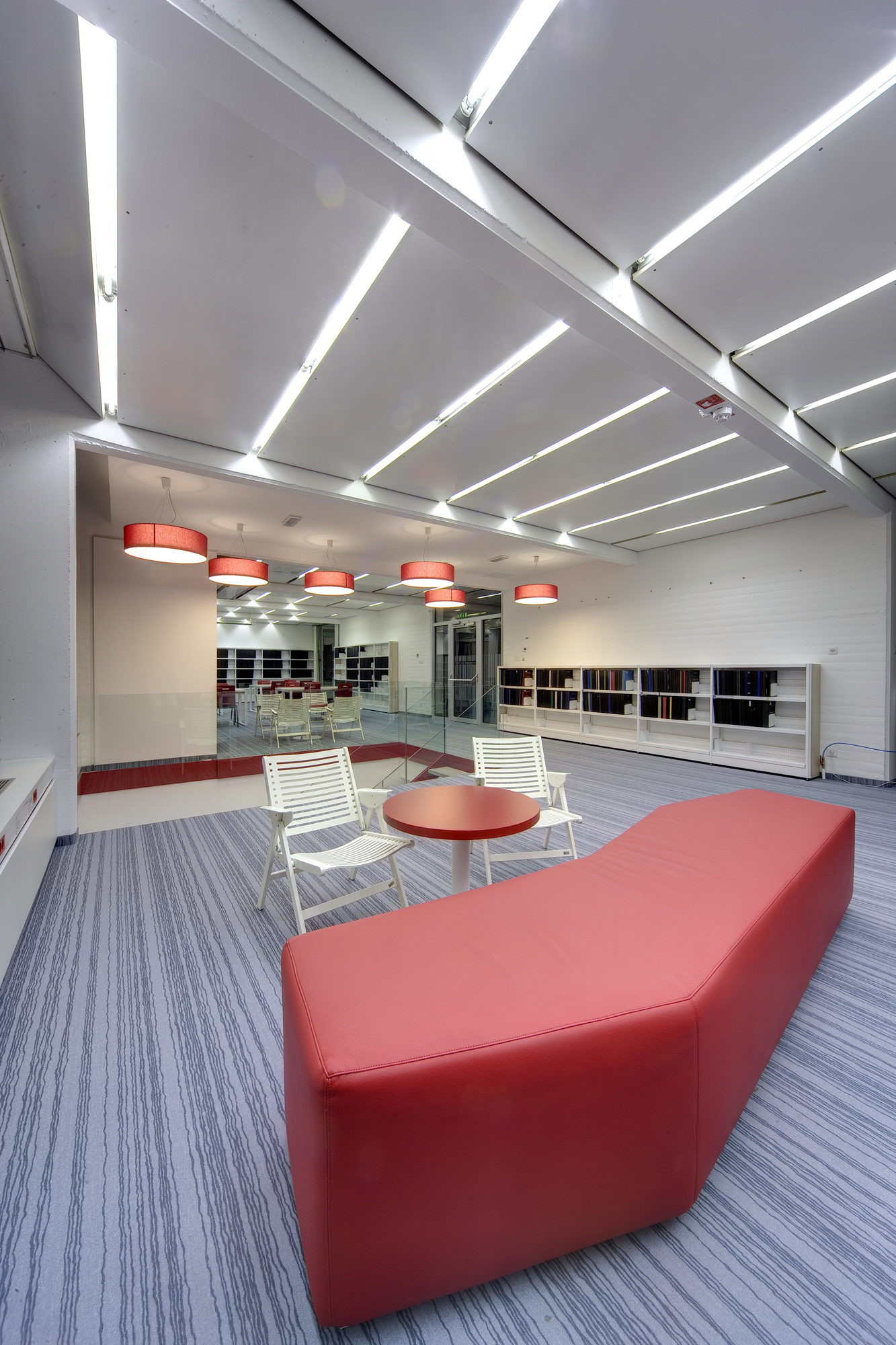 Economics Library by Tria Studio - Architizer