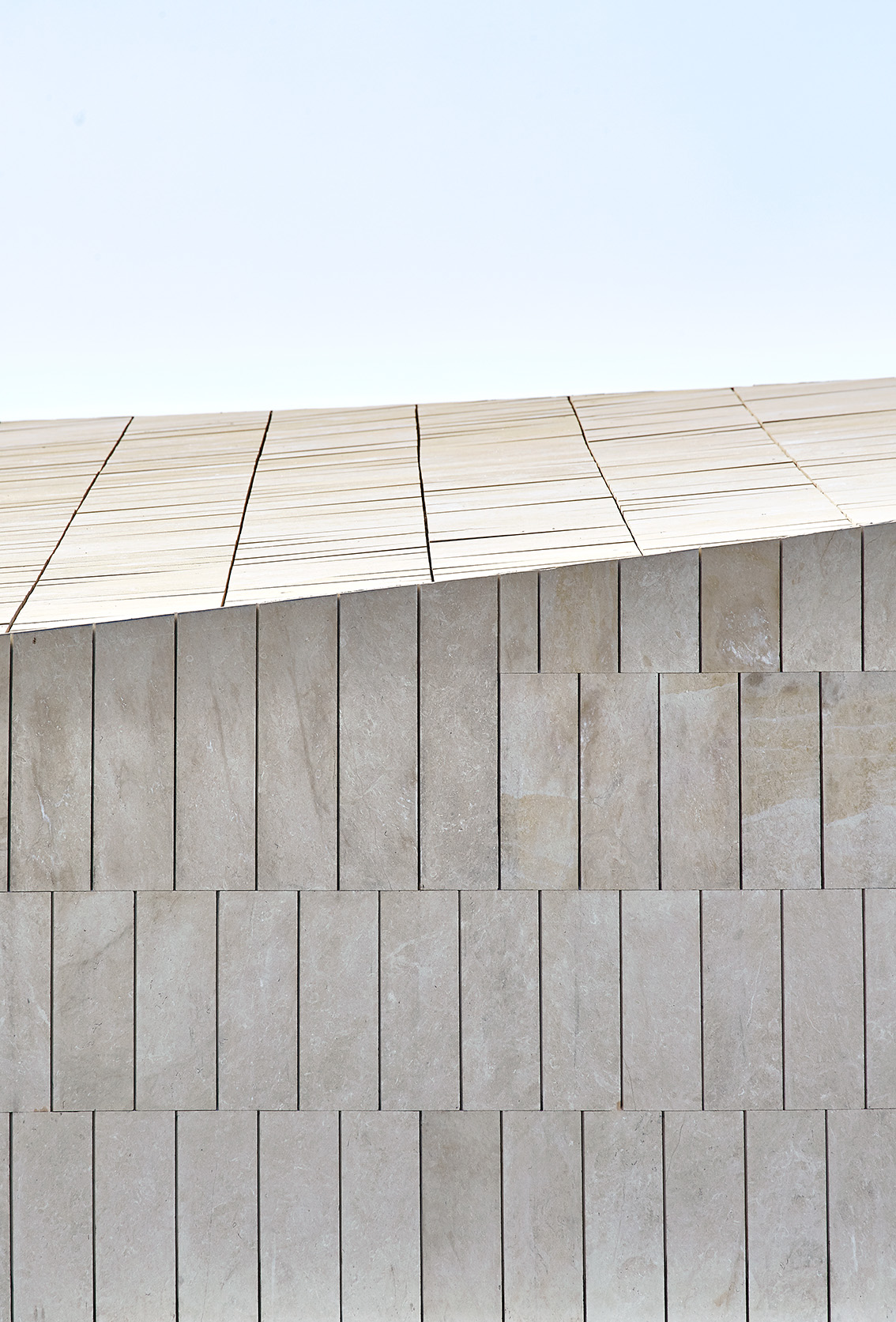 Stone Façades: 8 Slotted Elevations Sculpted by Light - Architizer Journal
