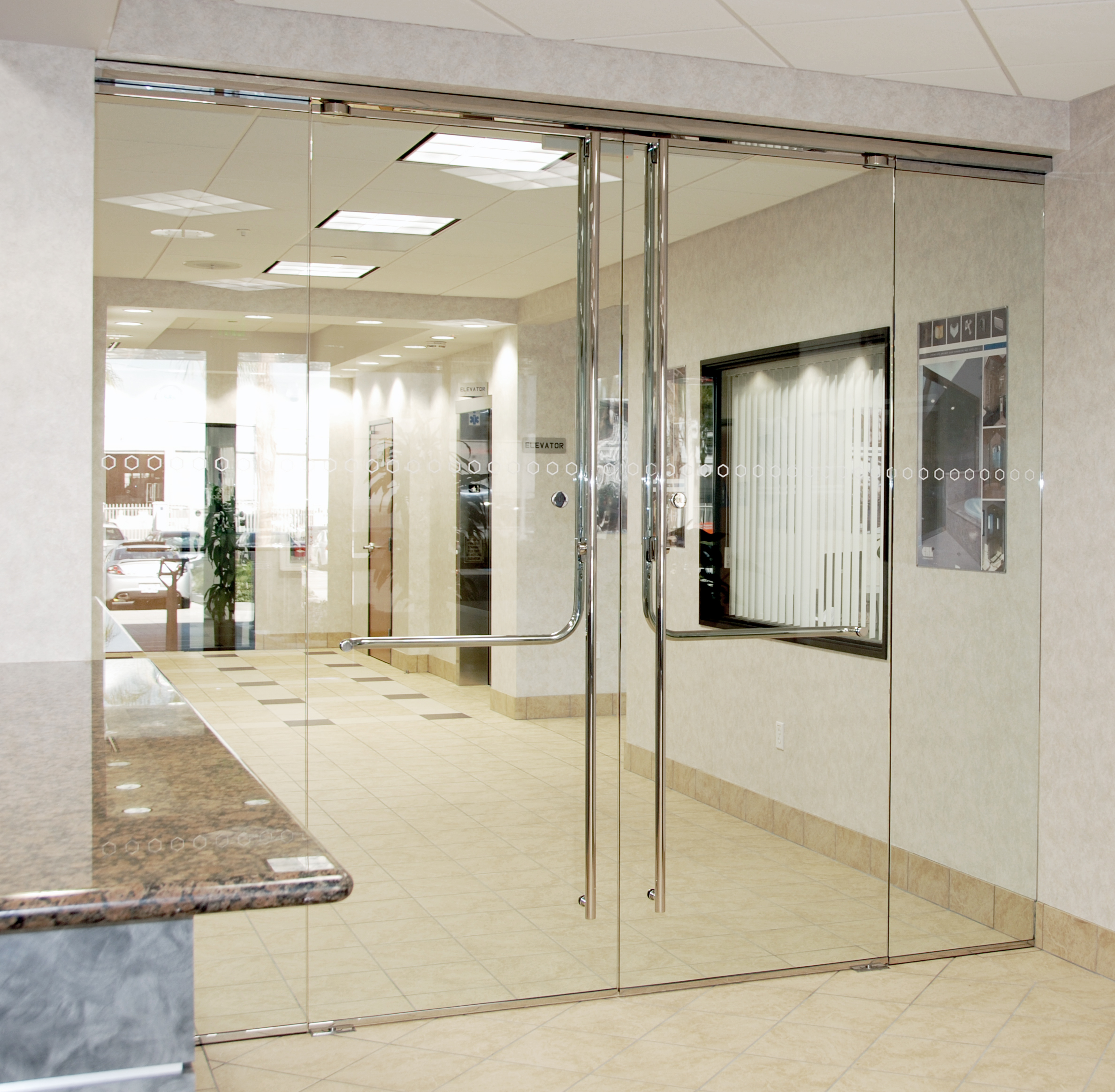 Blumcraft® 1301 Series All-Glass Entrance System - Architizer