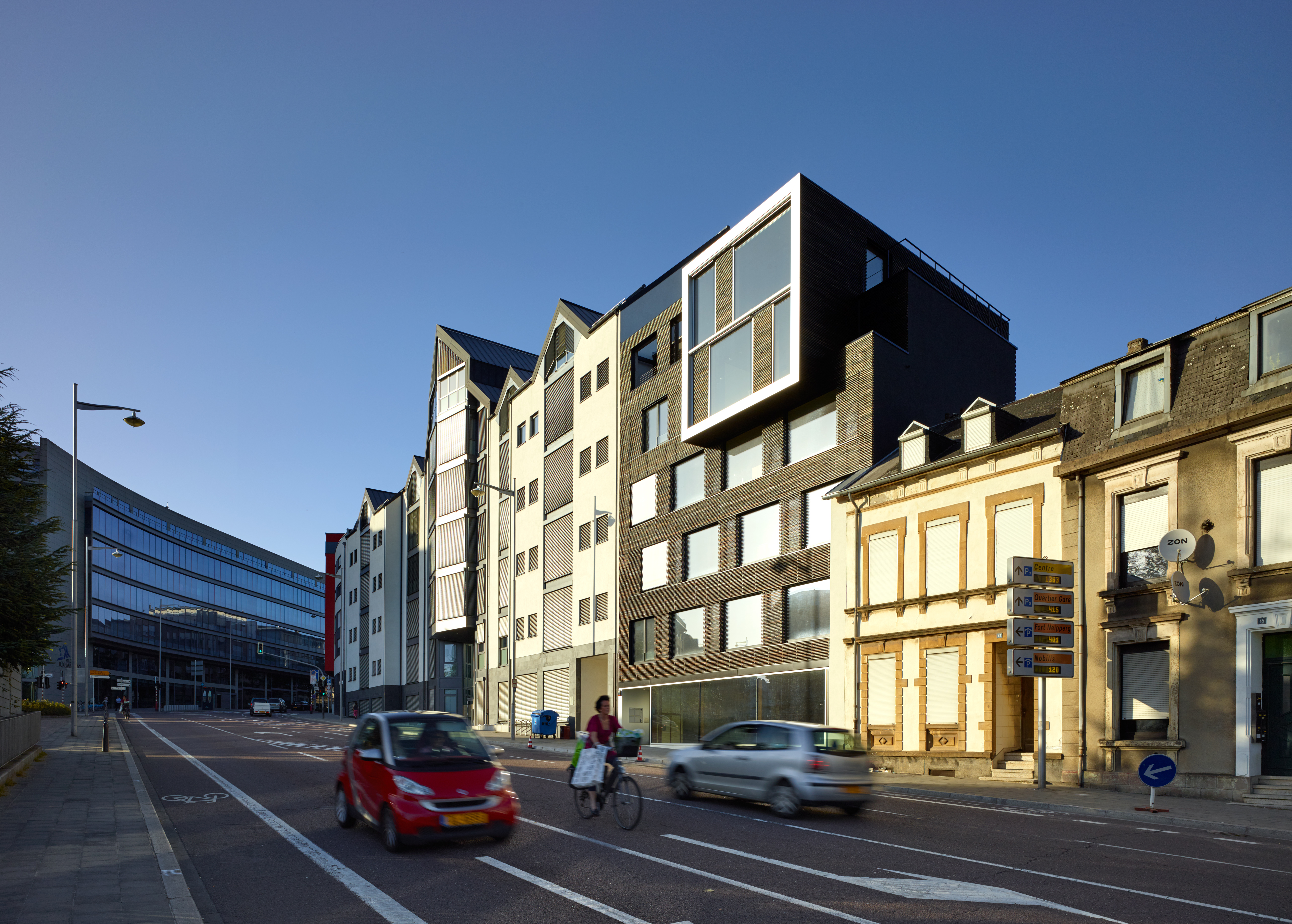 Rocade_Office & retail building with burnt wood facade yakisugi by STDM ...