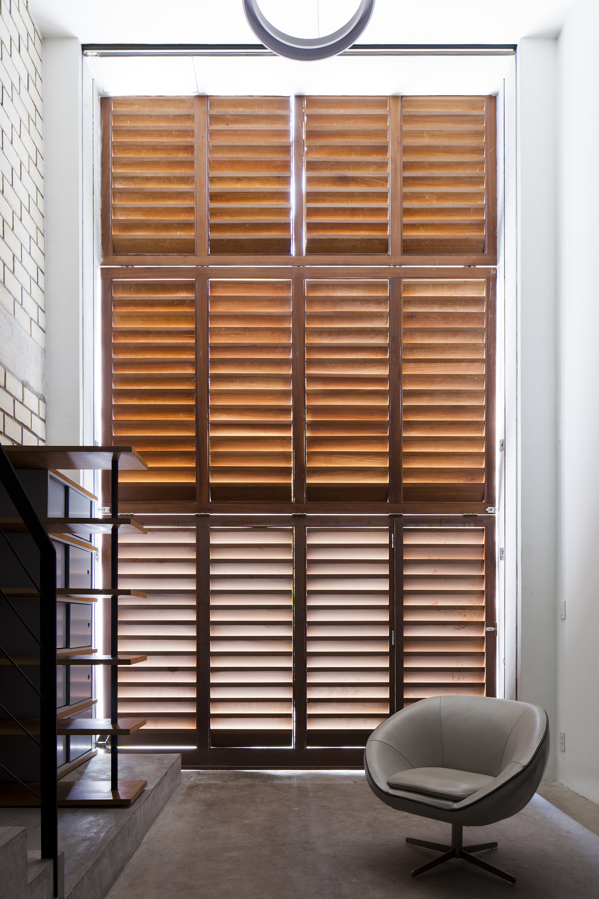 Townhouse With a Folding-Up Shutter by MM++ Architects / MIMYA - Architizer