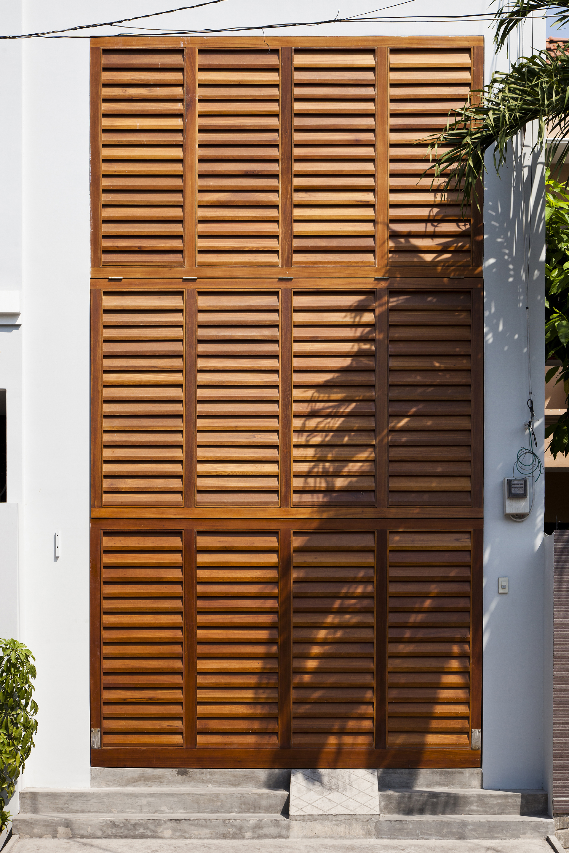 Townhouse With a Folding-Up Shutter by MM++ Architects / MIMYA - Architizer