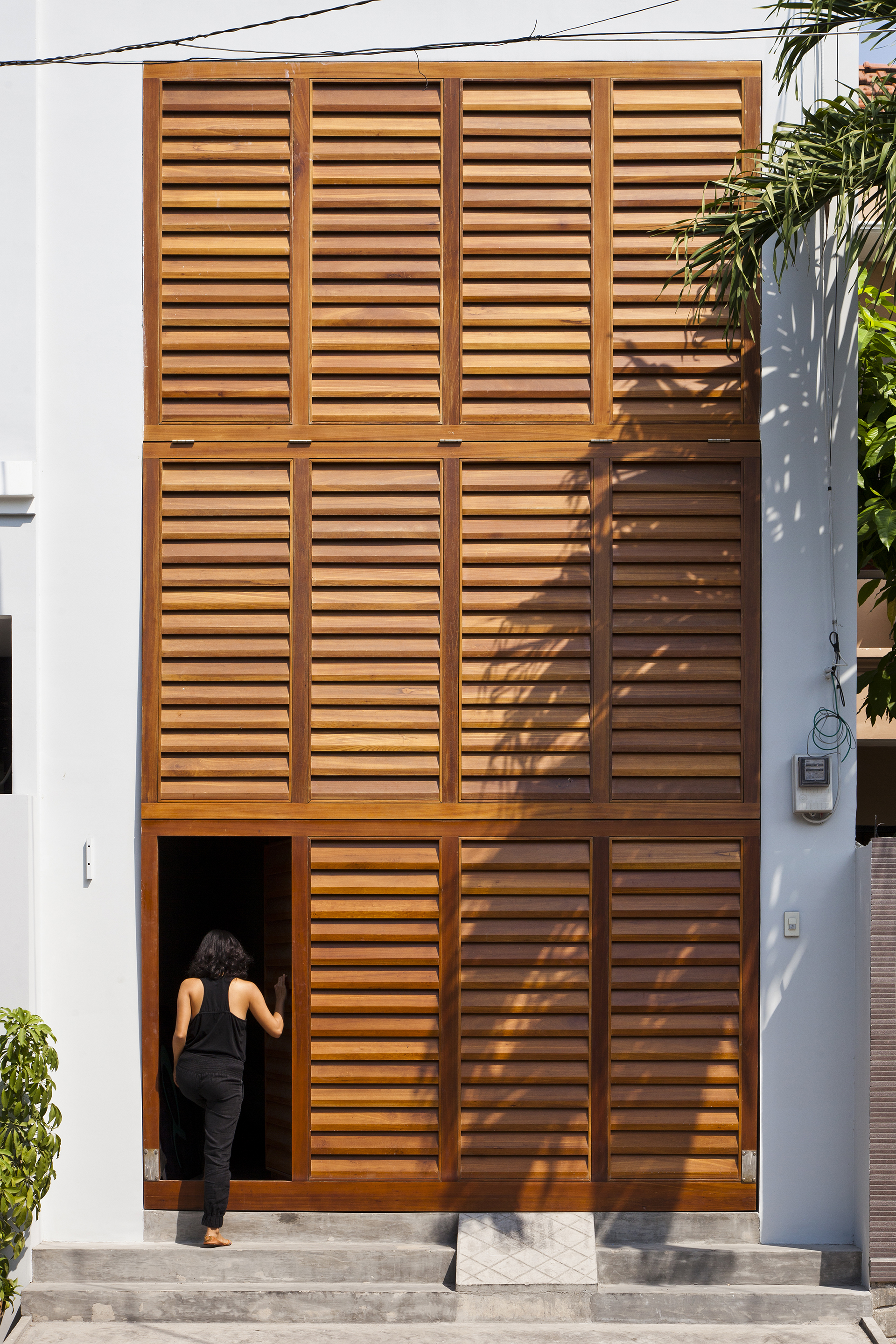 Townhouse With a Folding-Up Shutter by MM++ Architects / MIMYA - Architizer