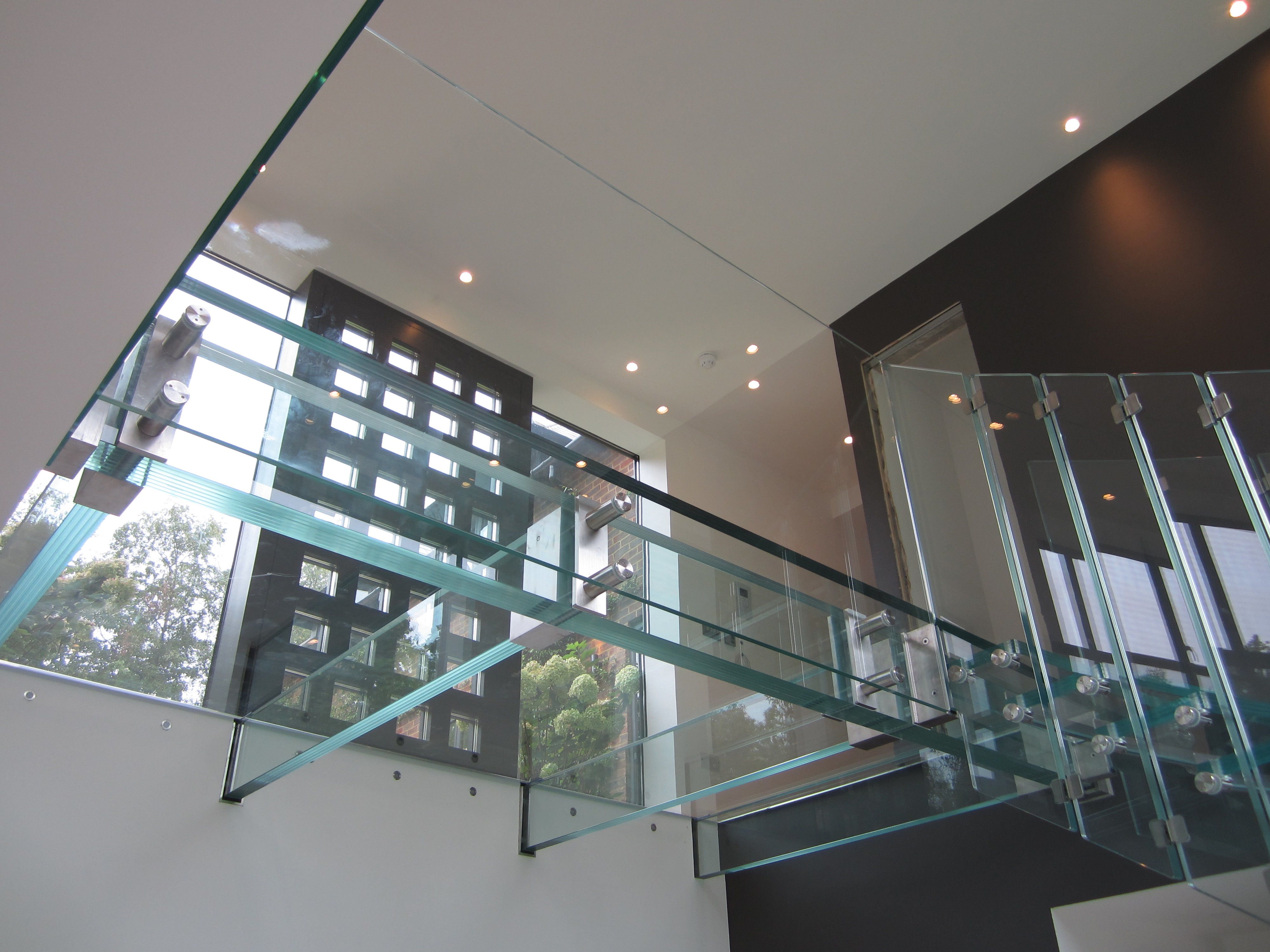 Architecural glass for stairs, walkway, facade and entrance portal by ...