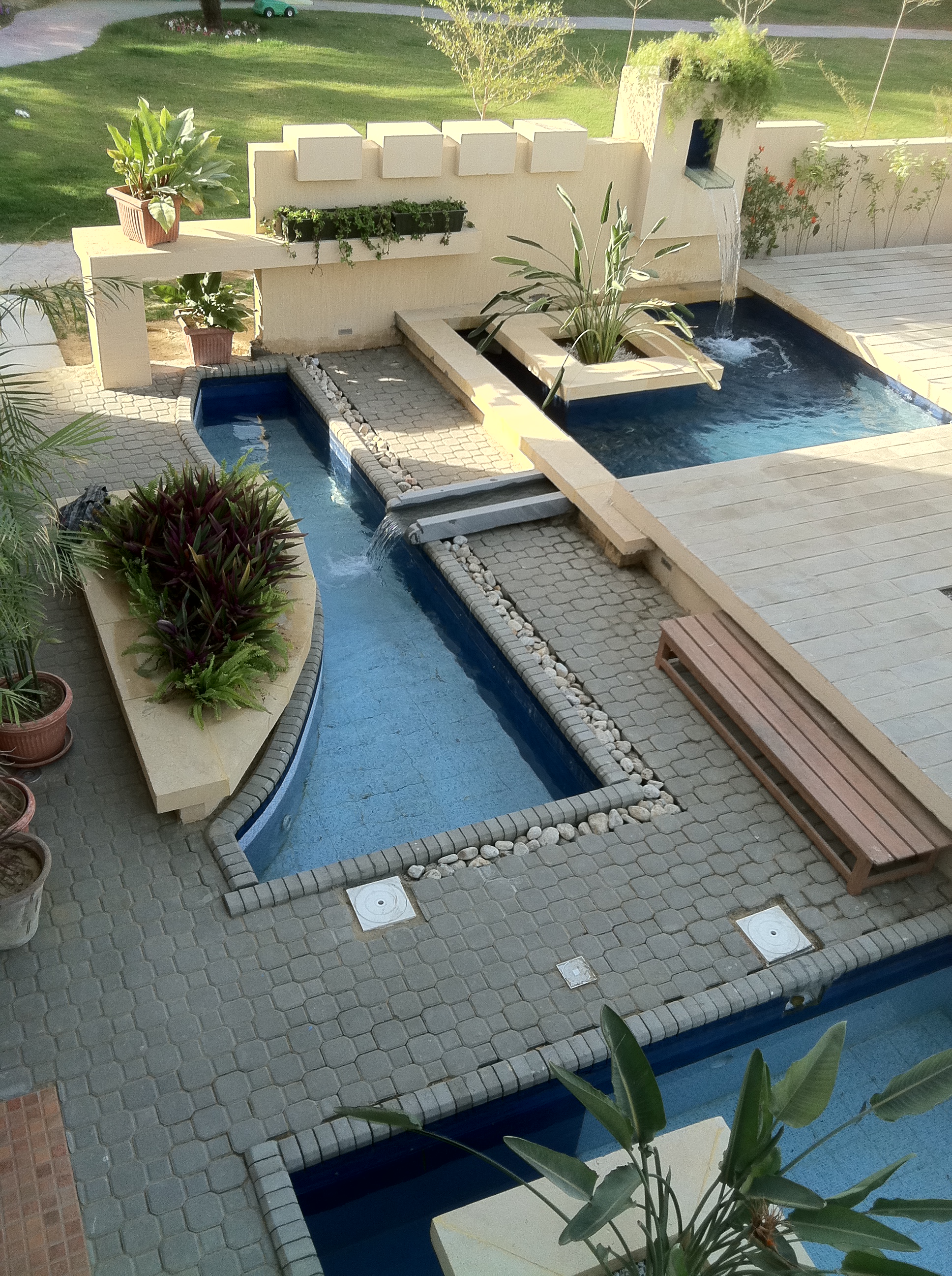 Home entrance with a water feature and landscape by shadzynz - Architizer
