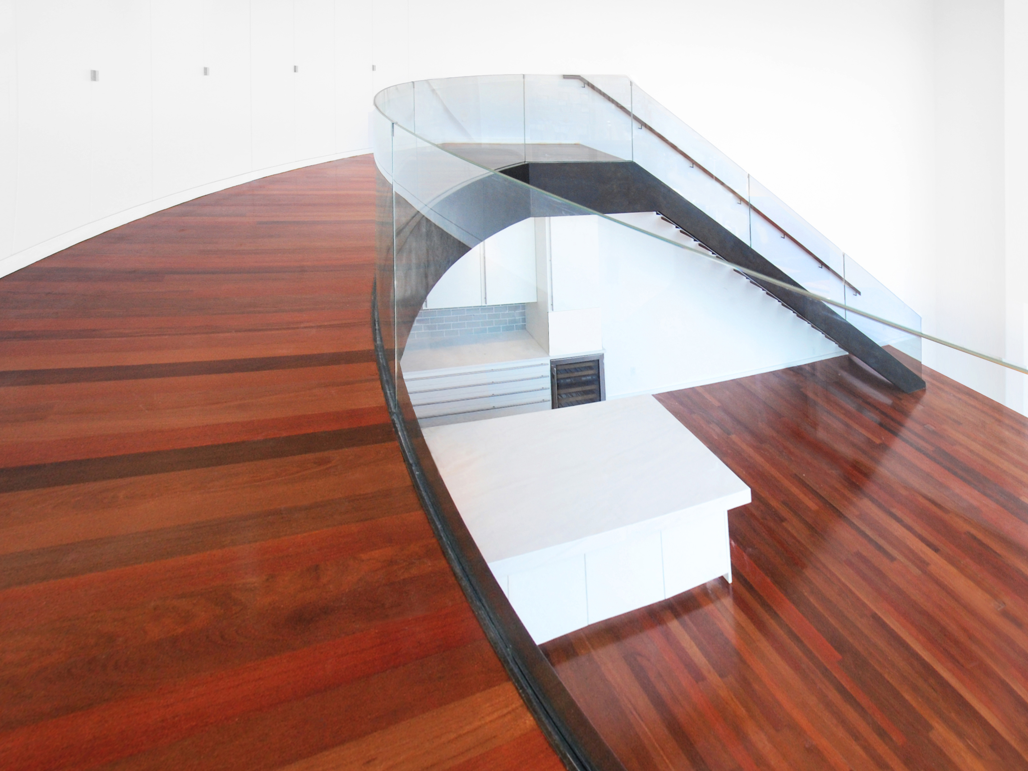 Blacked steel staircase with mezzanine by Serett Metalworks Corp ...