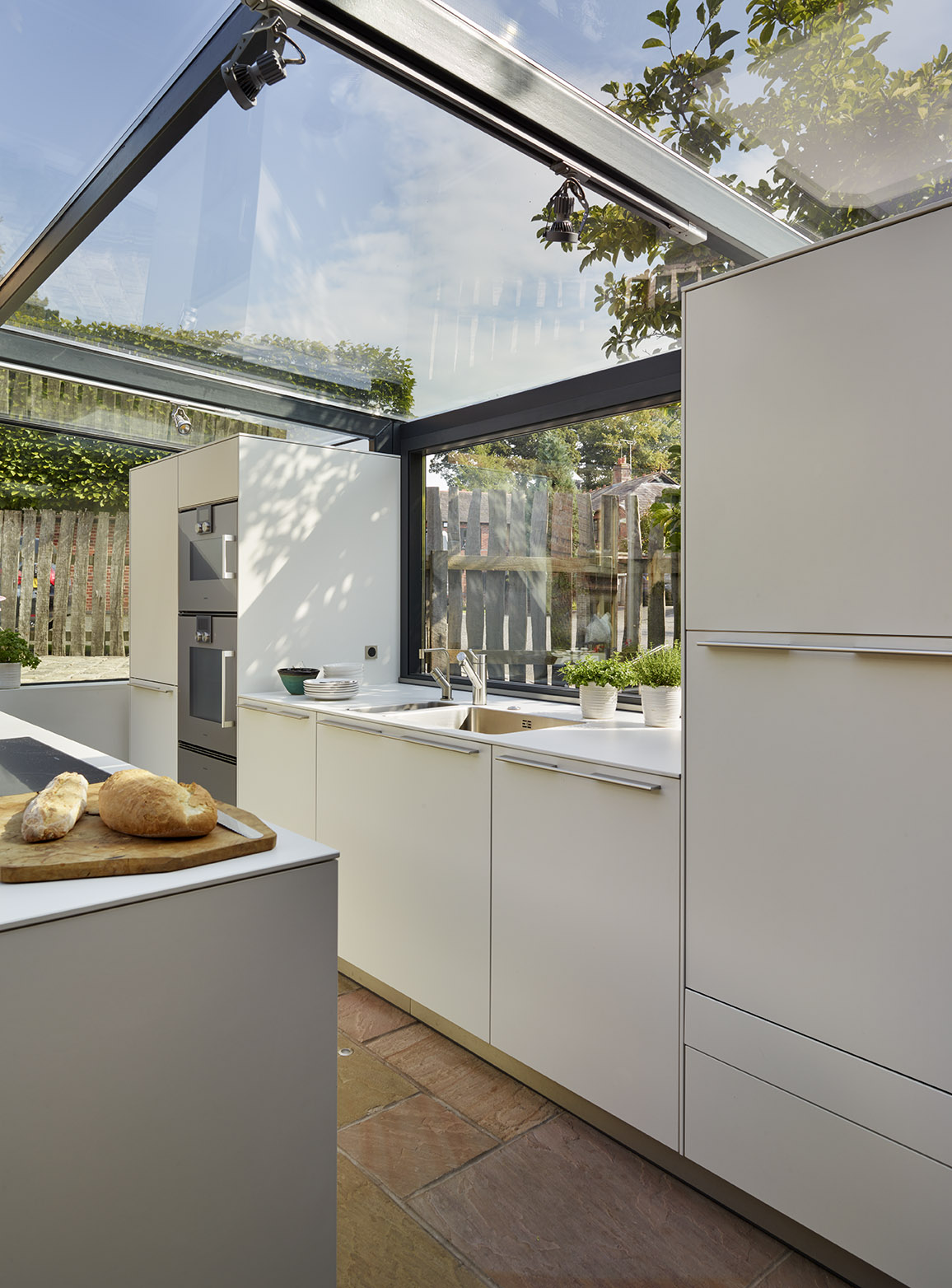 Glass box extension on thatched cottage: Kitchen Architecture's ...