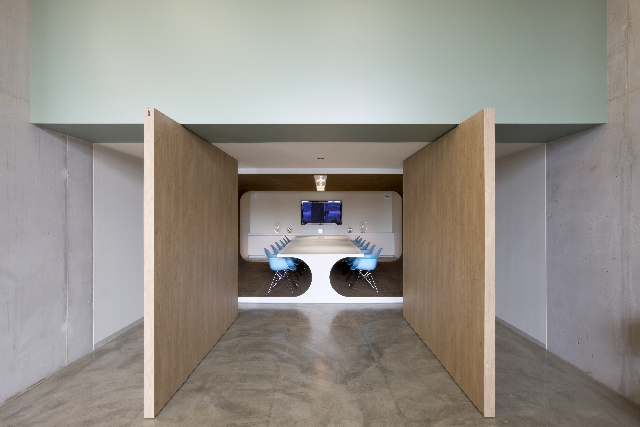 PIVOT WALL IN CONFERENCE ROOM POSTPANIC - Architizer