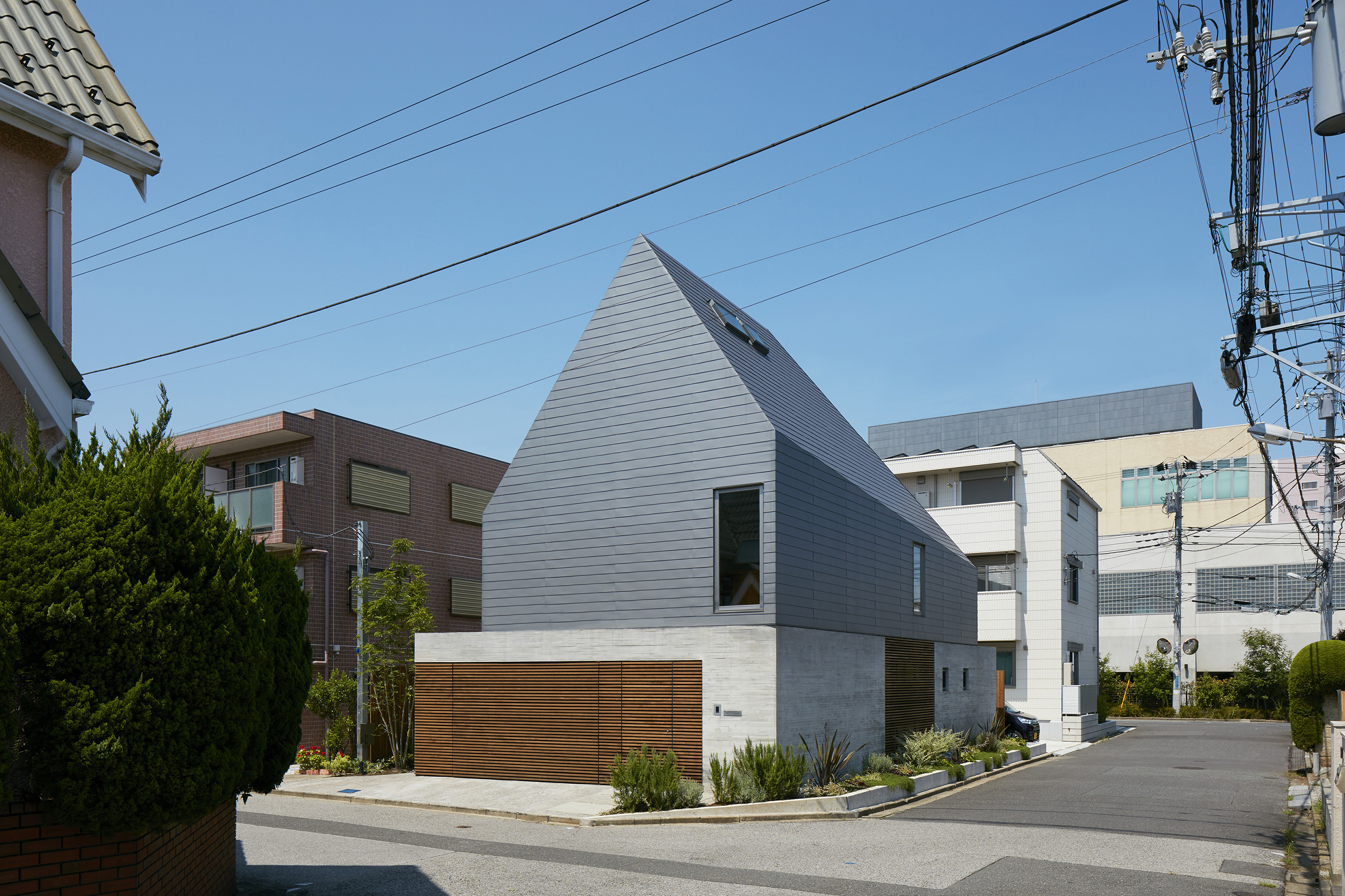 Asymmetric House by KIAS - Architizer