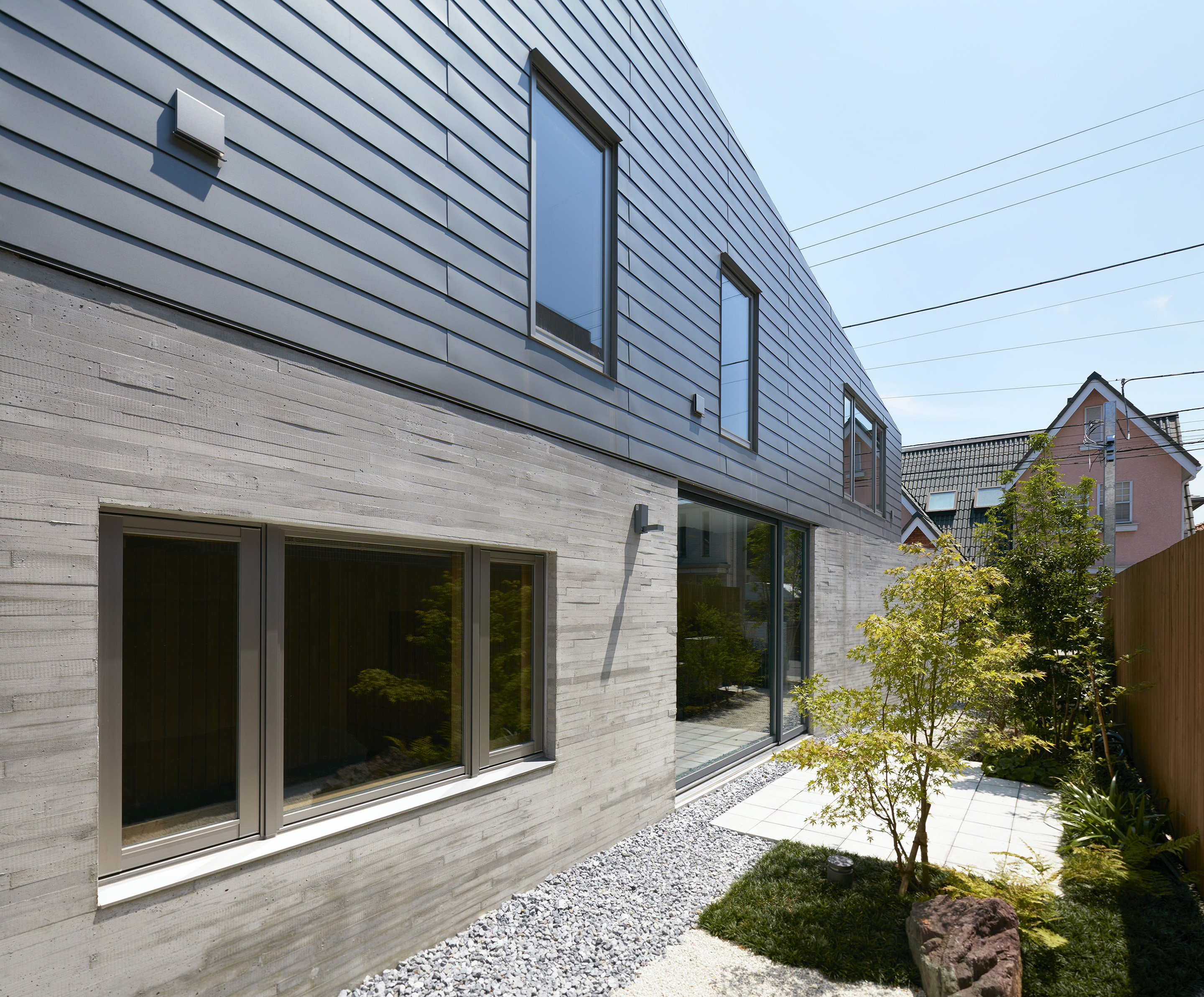 Asymmetric House by KIAS - Architizer