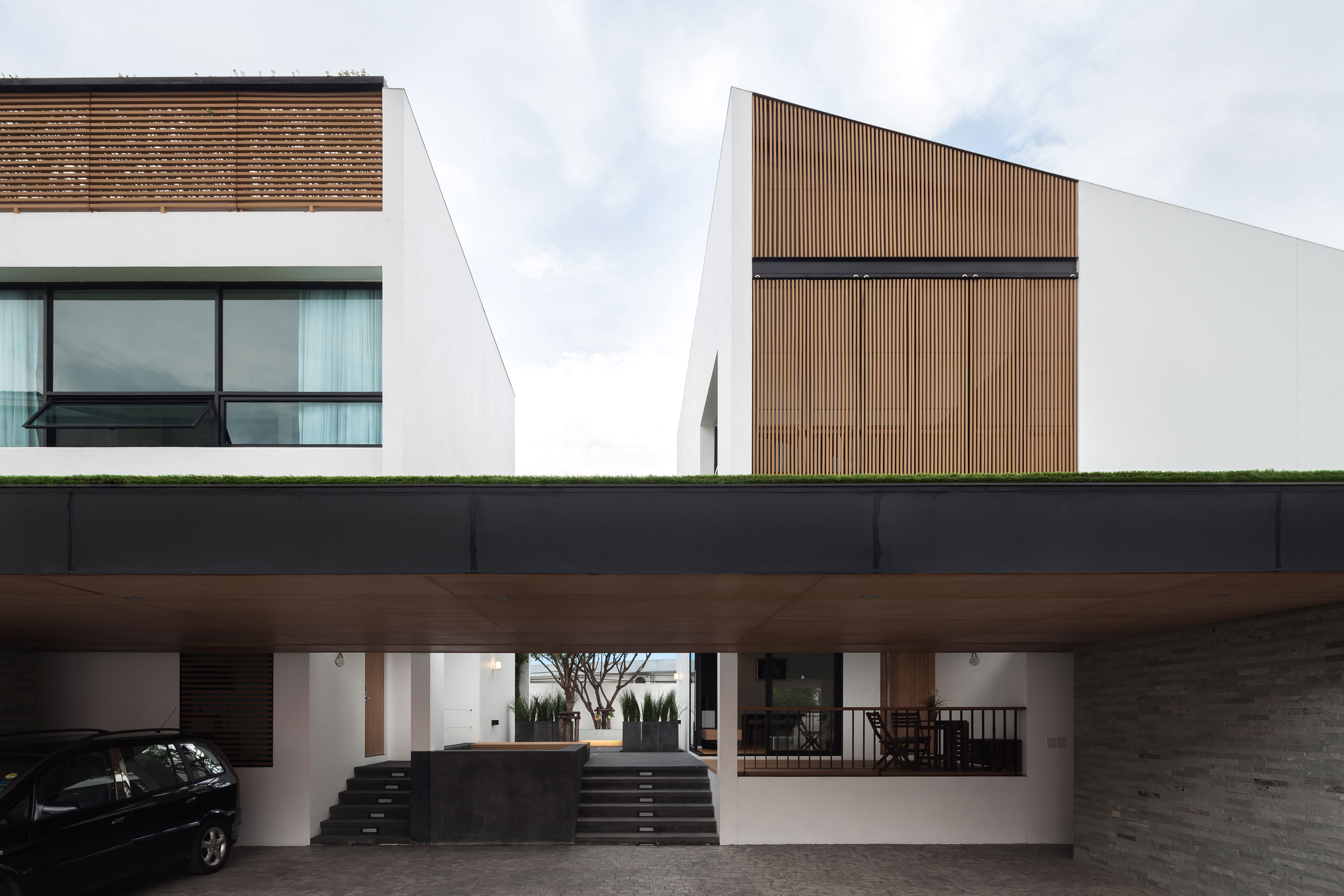 Twin House by poetic space studio - Architizer