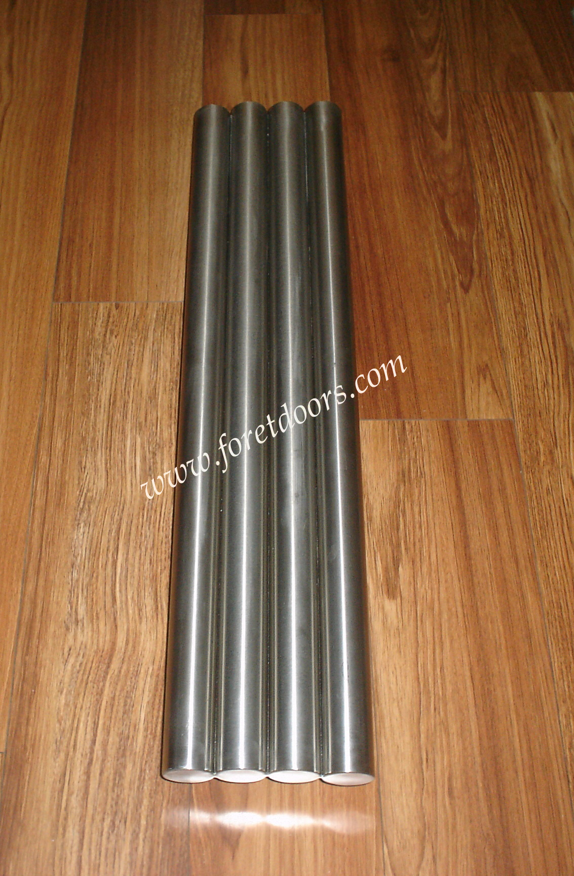 Modern stainless steel pulls by Foret Doors - Architizer