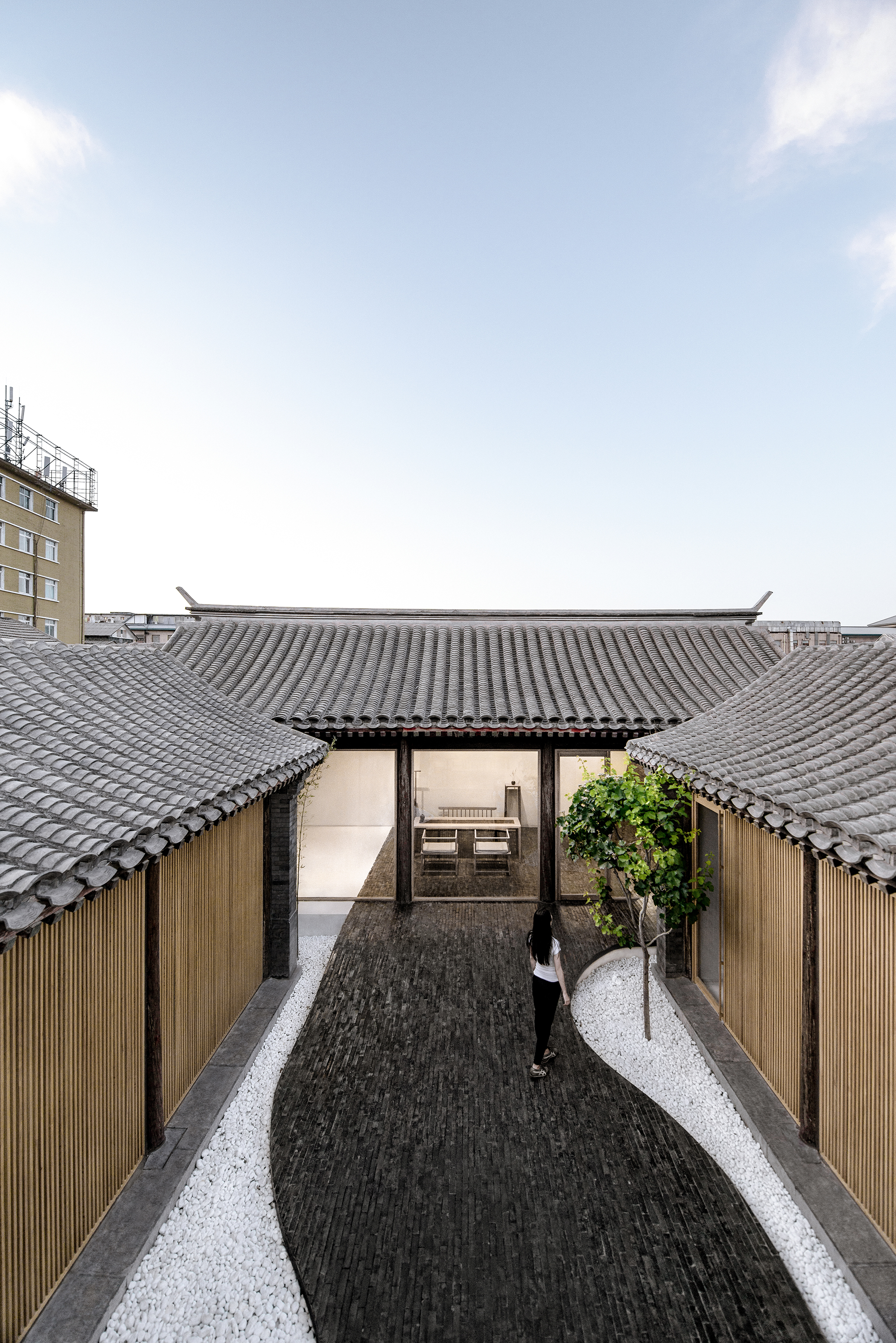 Twisting Courtyard by ARCHSTUDIO - Architizer
