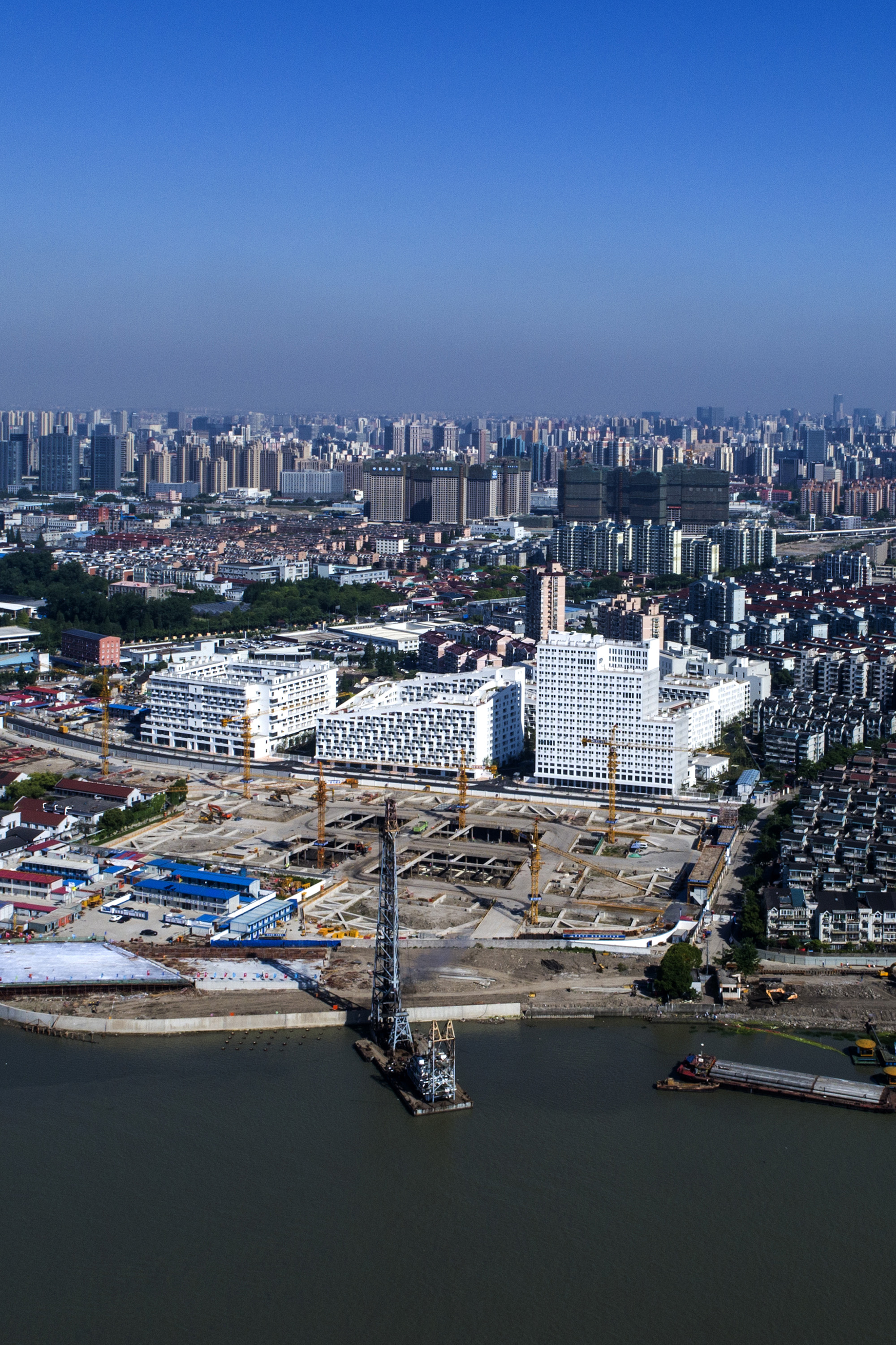 Longnan Garden Social Housing Estate by Atelier GOM - Architizer