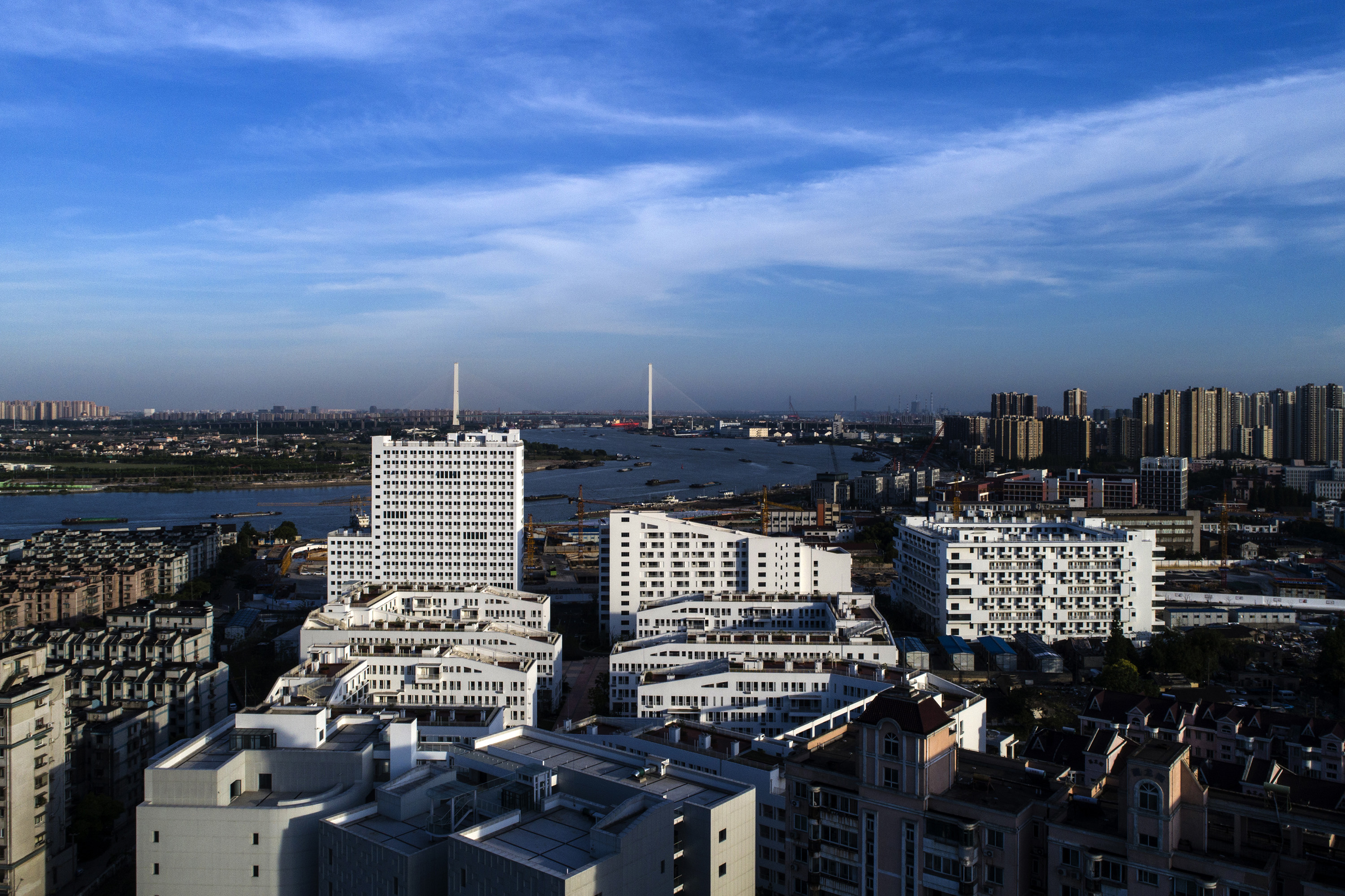 Longnan Garden Social Housing Estate by Atelier GOM - Architizer