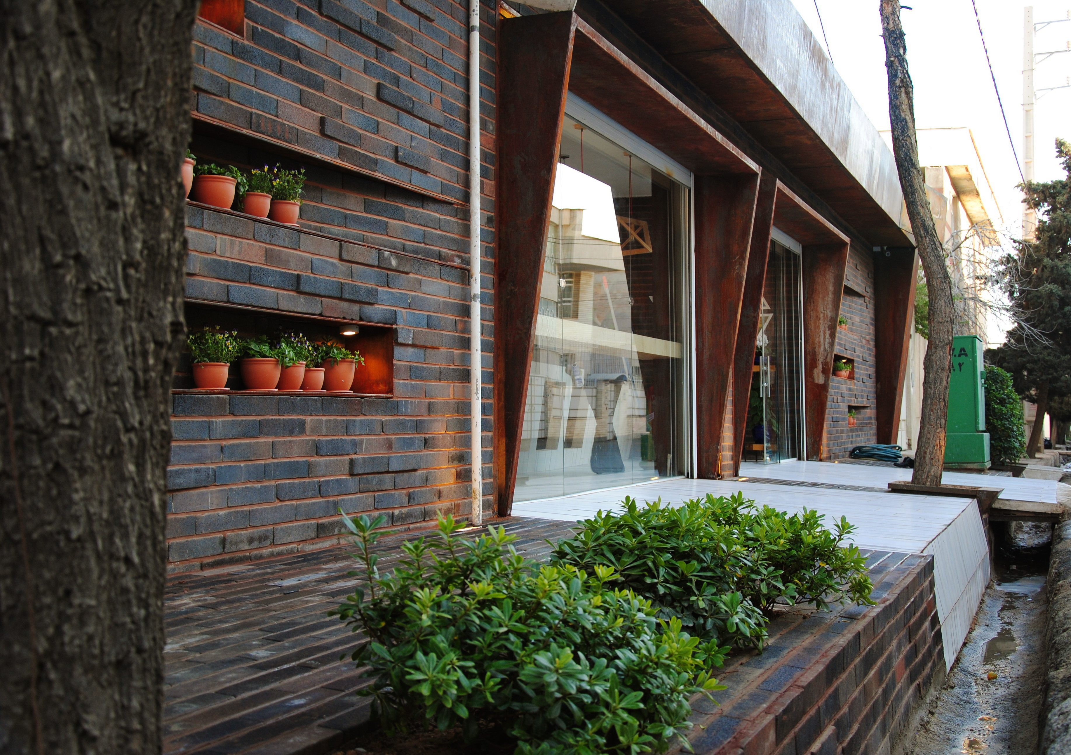 TRIANGLE CAFE by AshariArchitects - Architizer