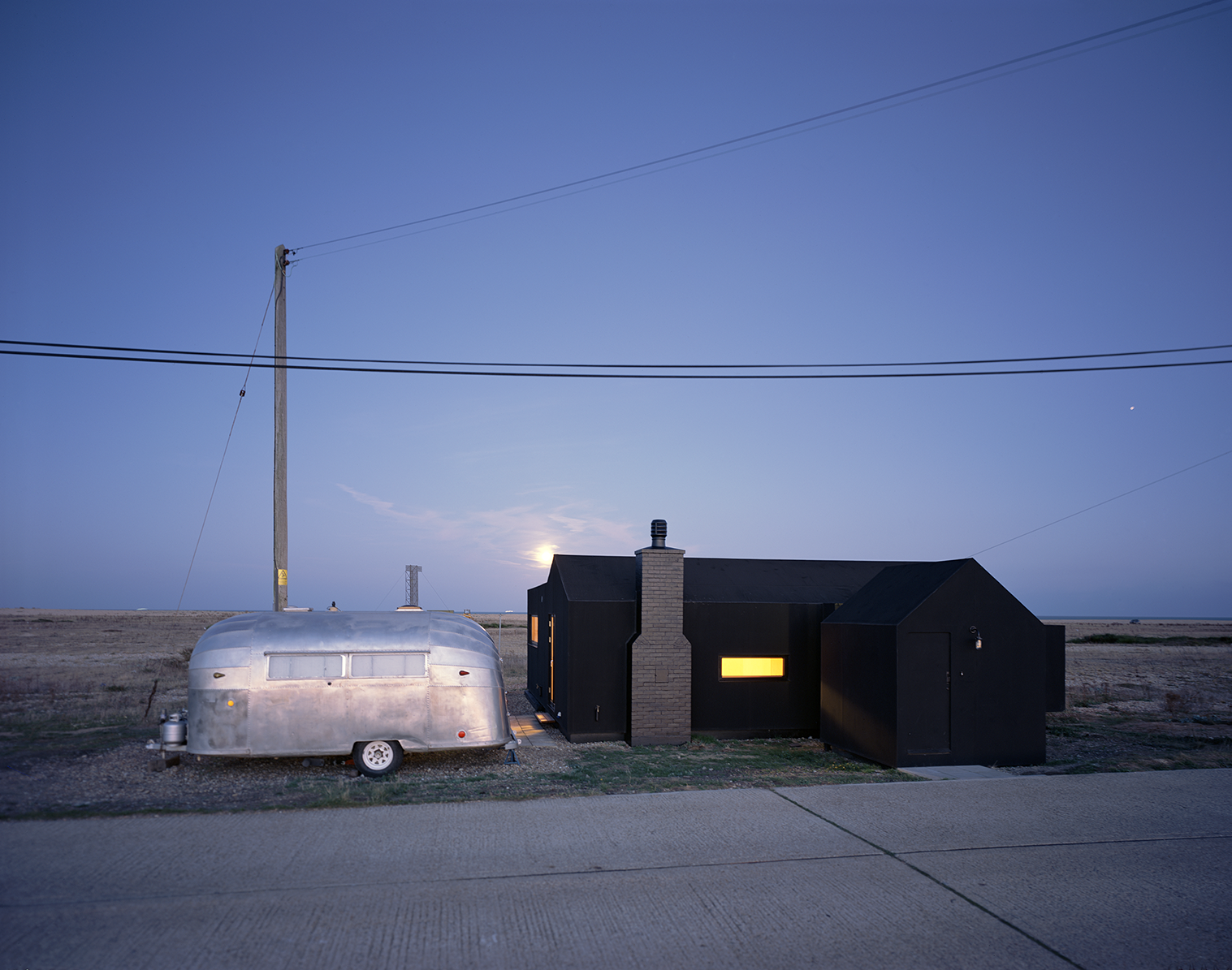 Black Rubber Beach House by Simon Conder Associates - Architizer
