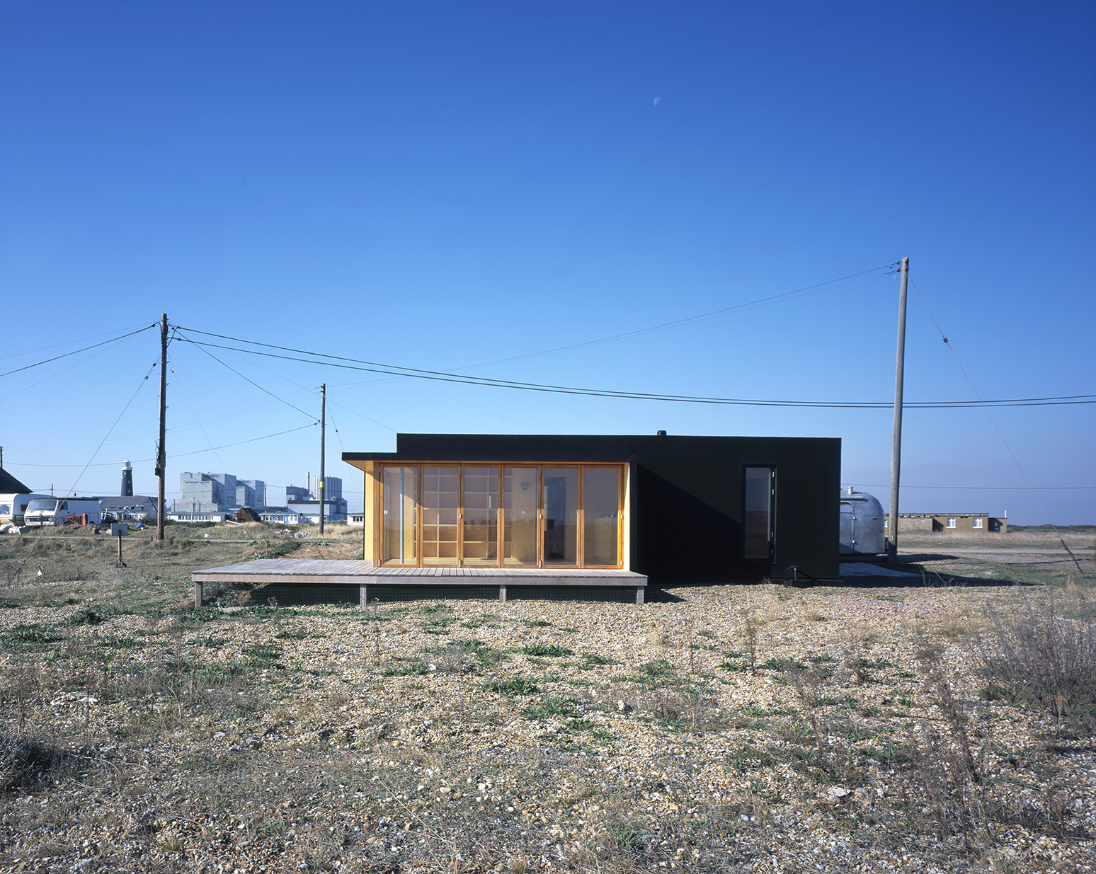 Black Rubber Beach House by Simon Conder Associates - Architizer