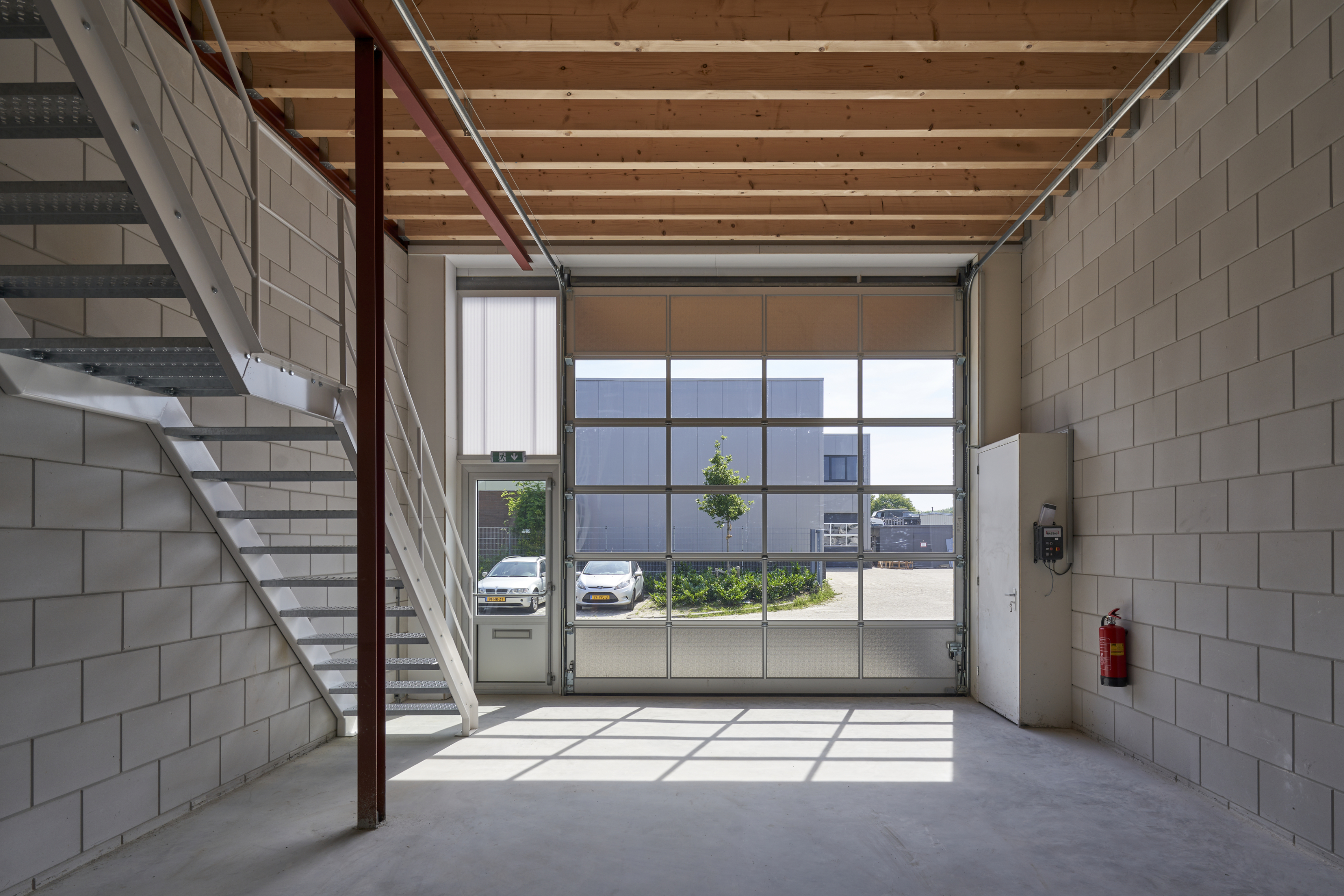 beautiful industrial building based on the qualities of the sawtooth ...
