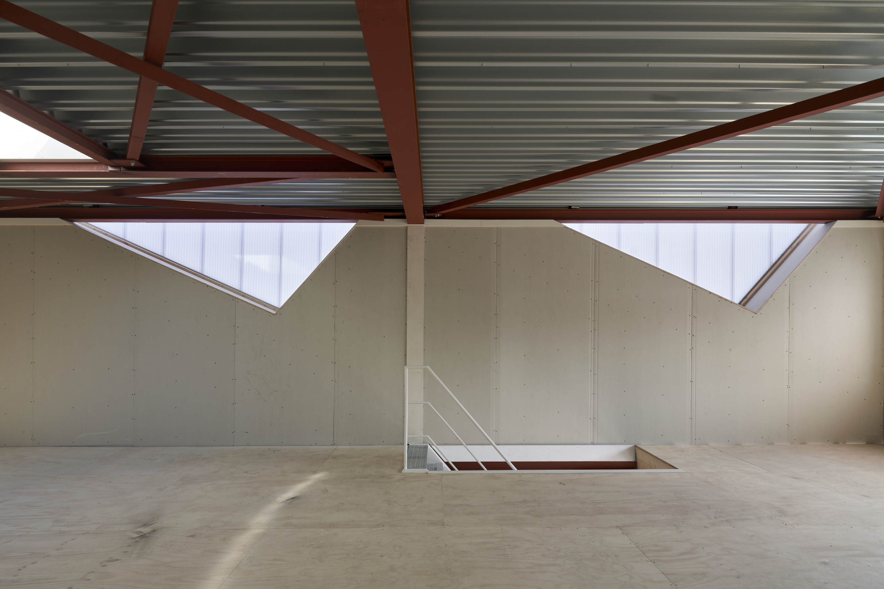 beautiful industrial building based on the qualities of the sawtooth ...