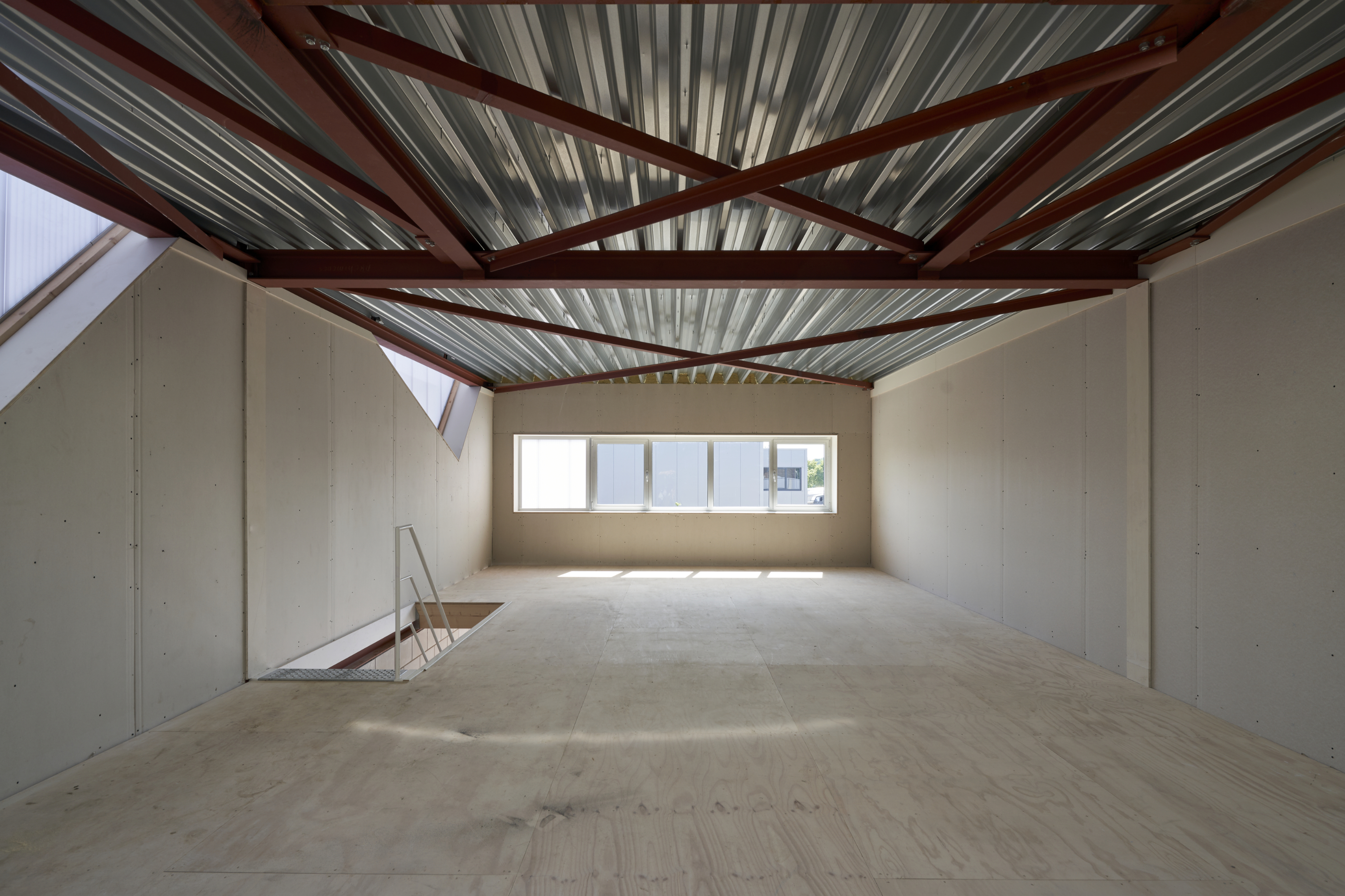 beautiful industrial building based on the qualities of the sawtooth ...