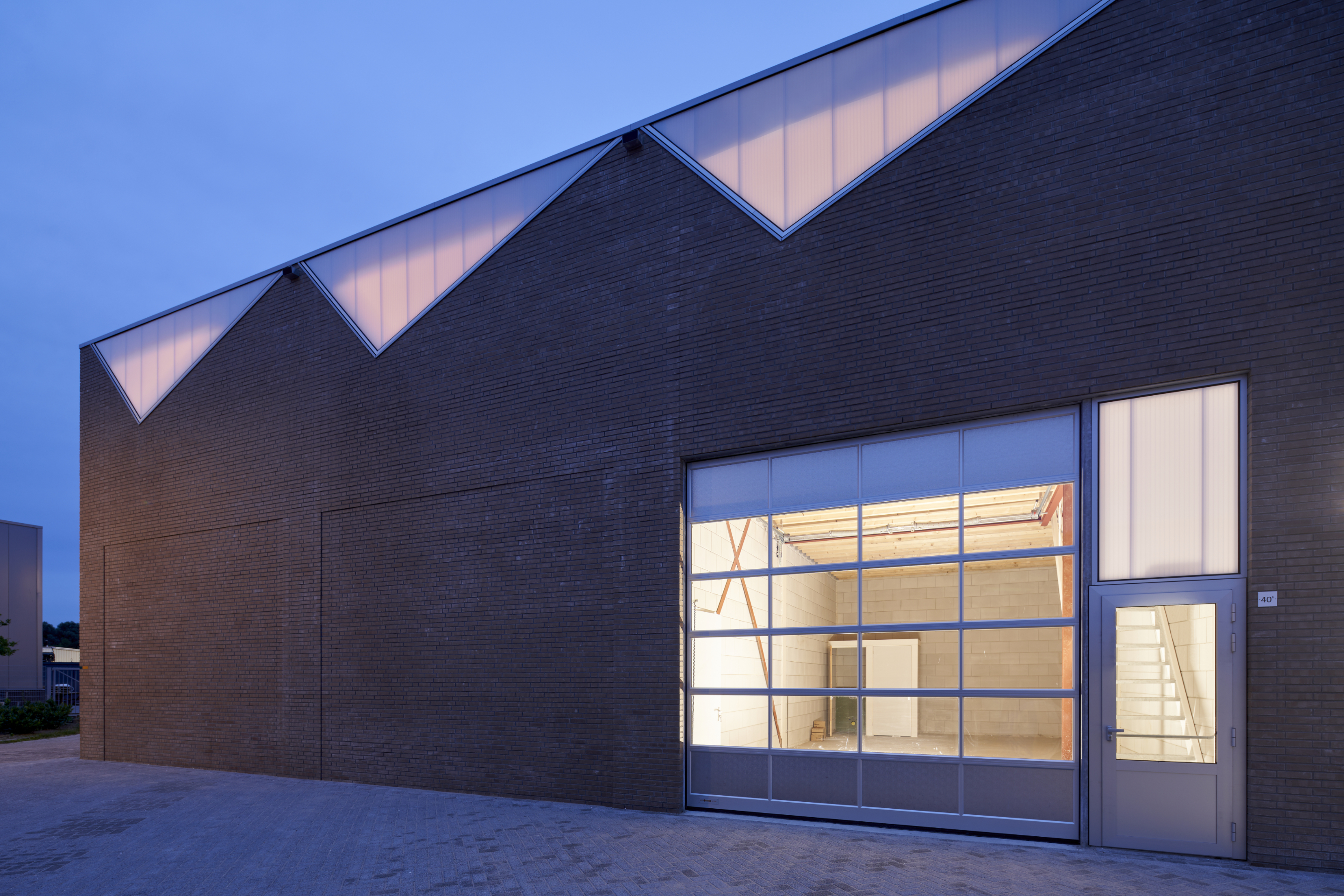 beautiful industrial building based on the qualities of the sawtooth ...