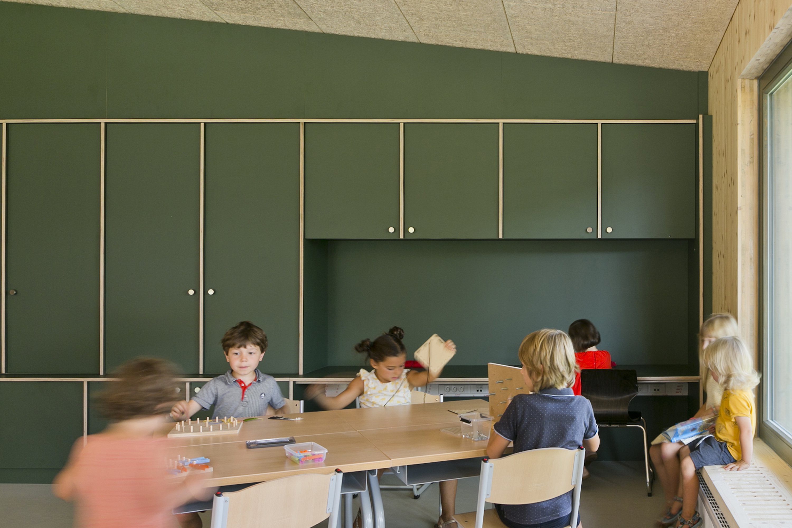 Groenendaal primary school park classrooms by HUB - Architizer
