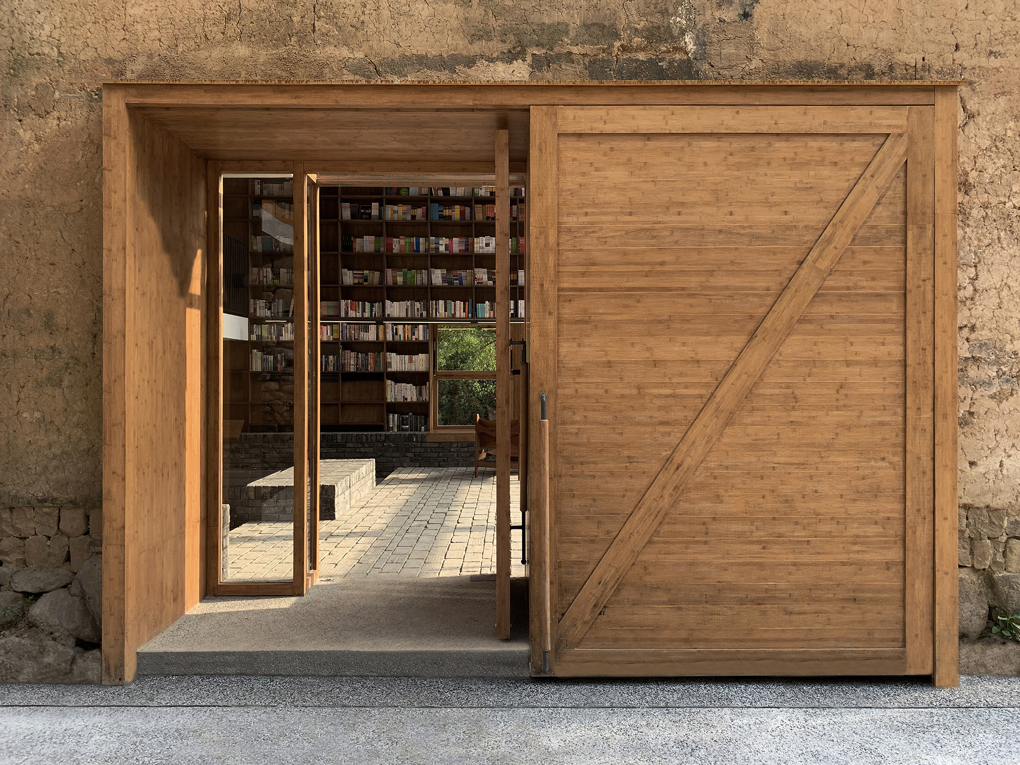 Capsule hotel in a rural library by Atelier tao+c - Architizer