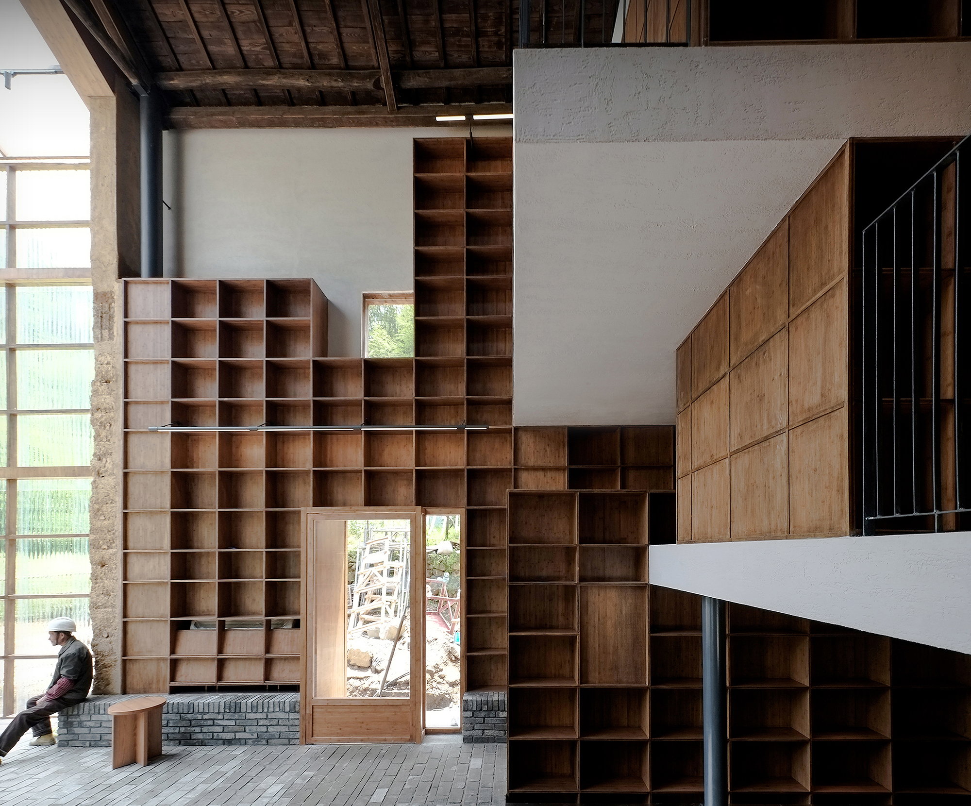 Capsule hotel in a rural library by Atelier tao+c - Architizer