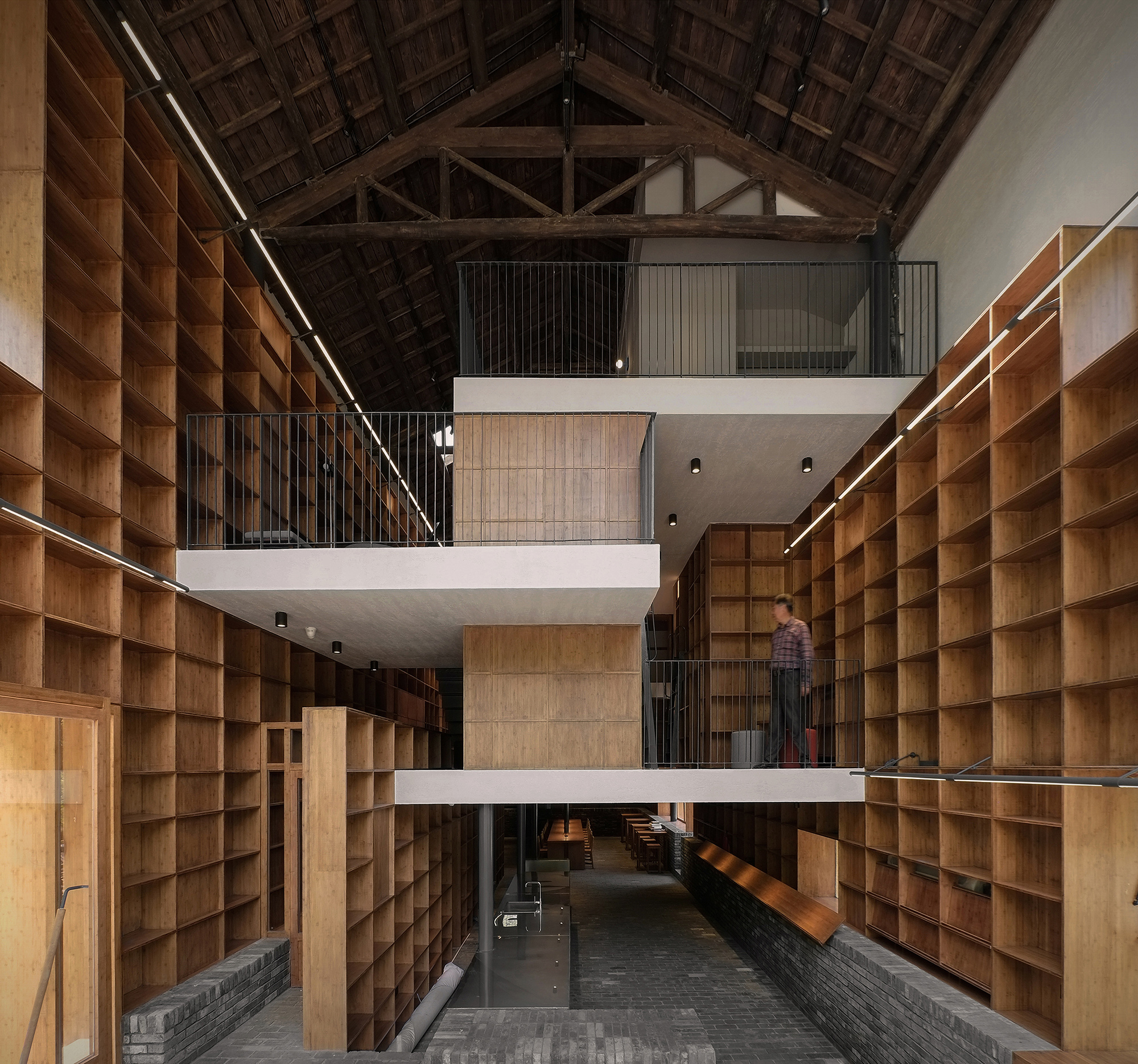 Capsule hotel in a rural library by Atelier tao+c - Architizer