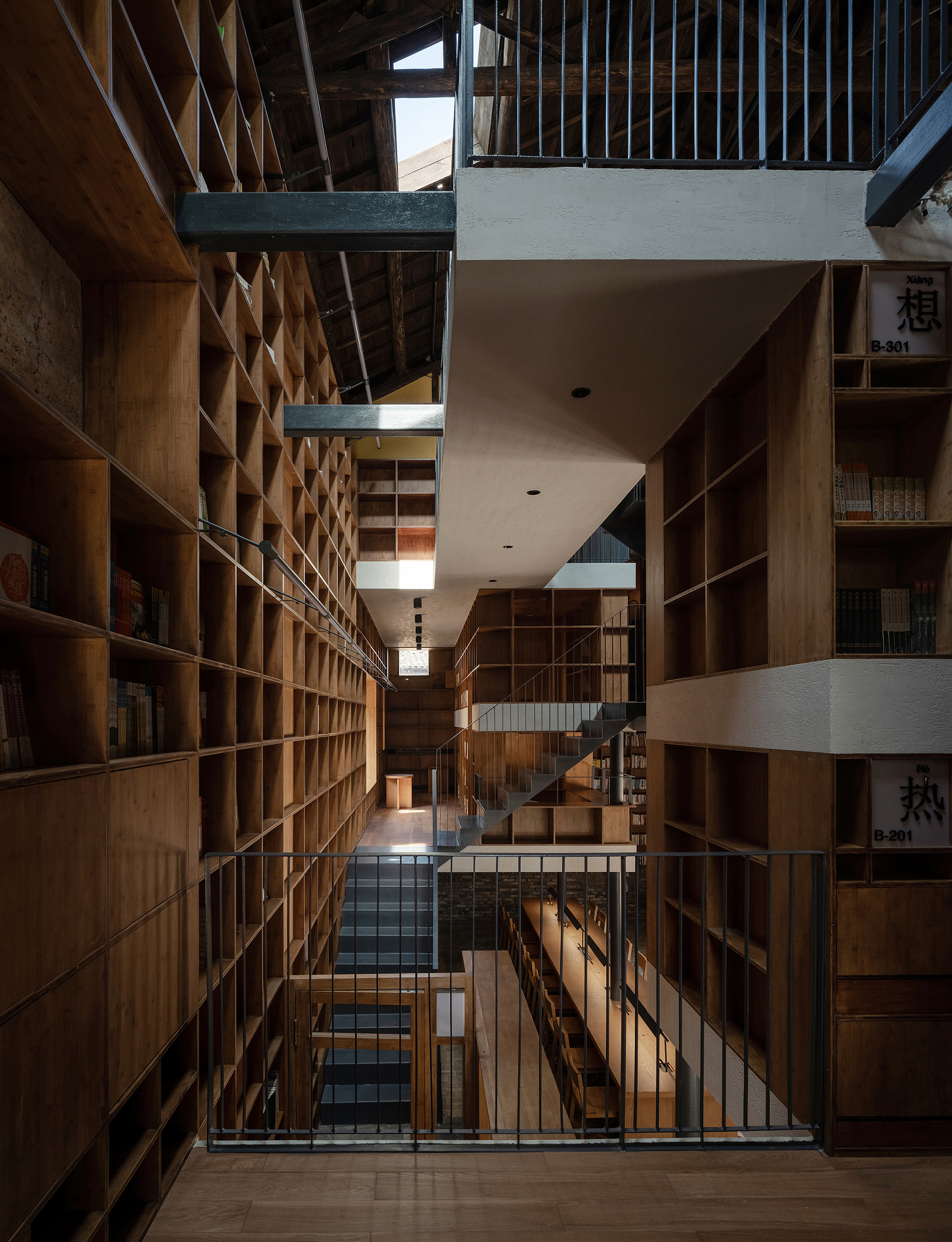 Capsule hotel in a rural library by Atelier tao+c - Architizer
