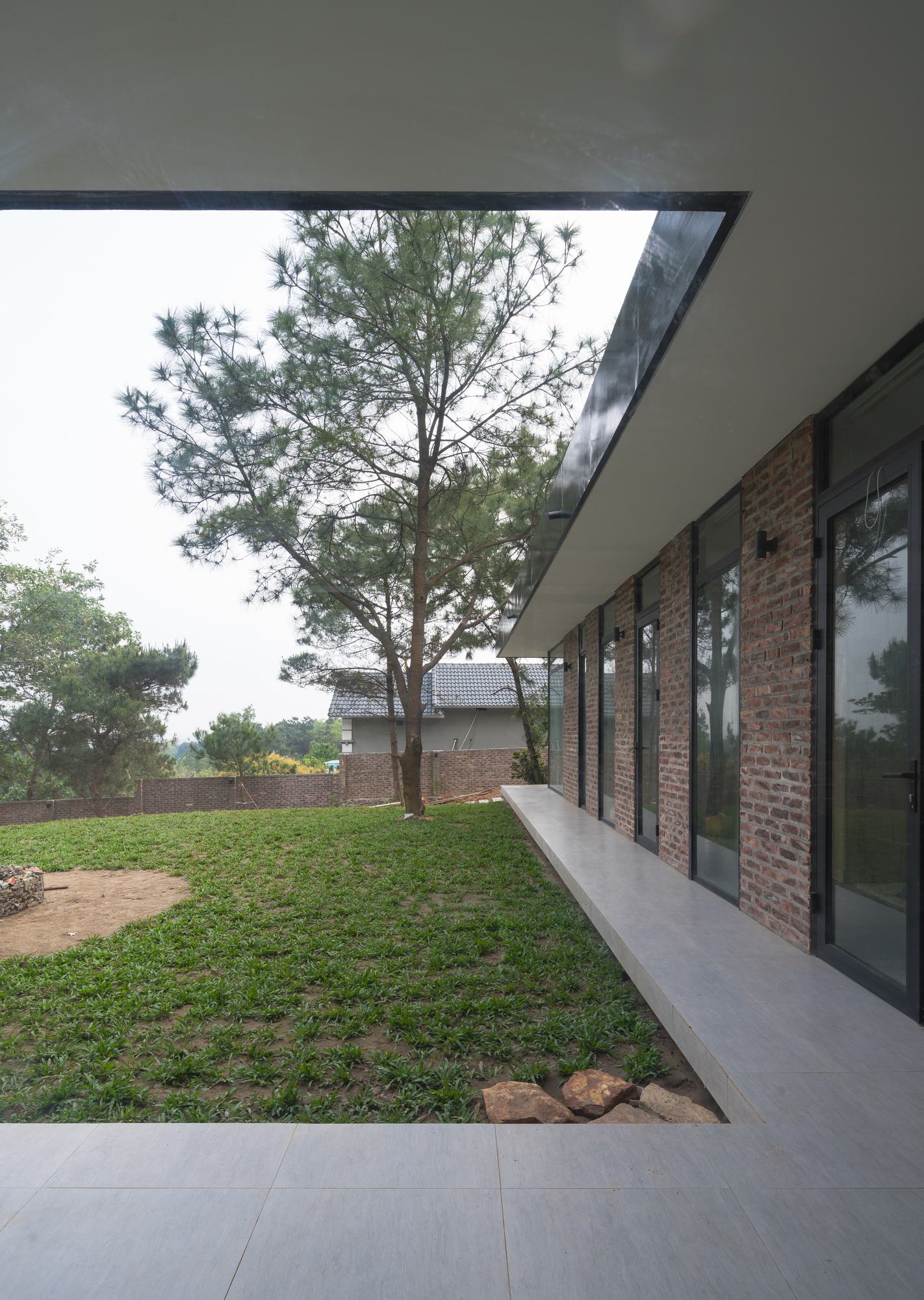 House under the Pines by idee architects Vietnam - Architizer