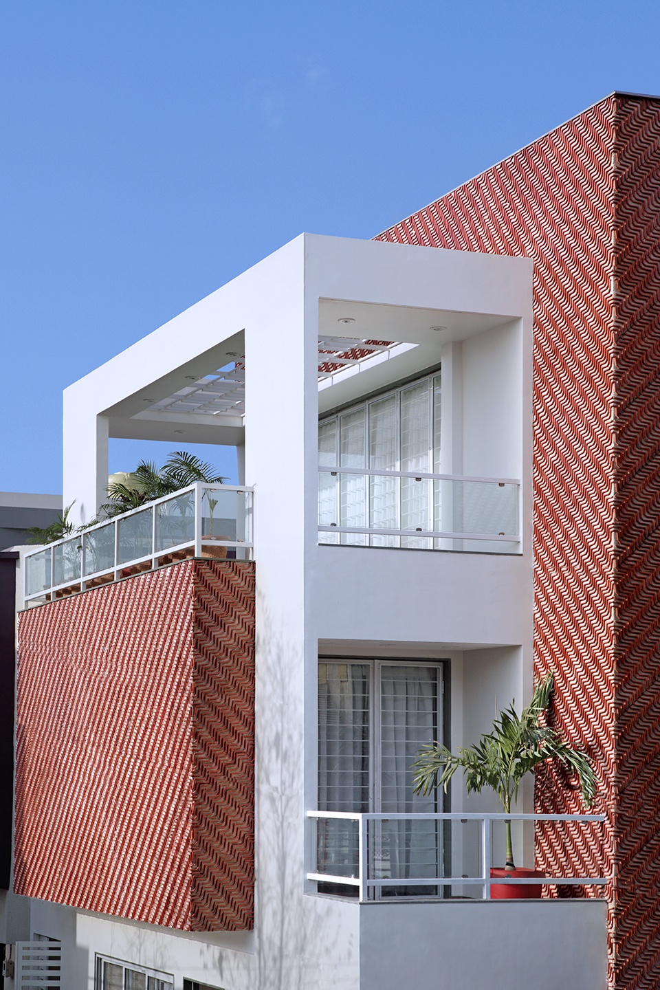 EARTHY RED COLORED WAVY CLAY TILES FACADE CLADDING by MANOJ PATEL ...