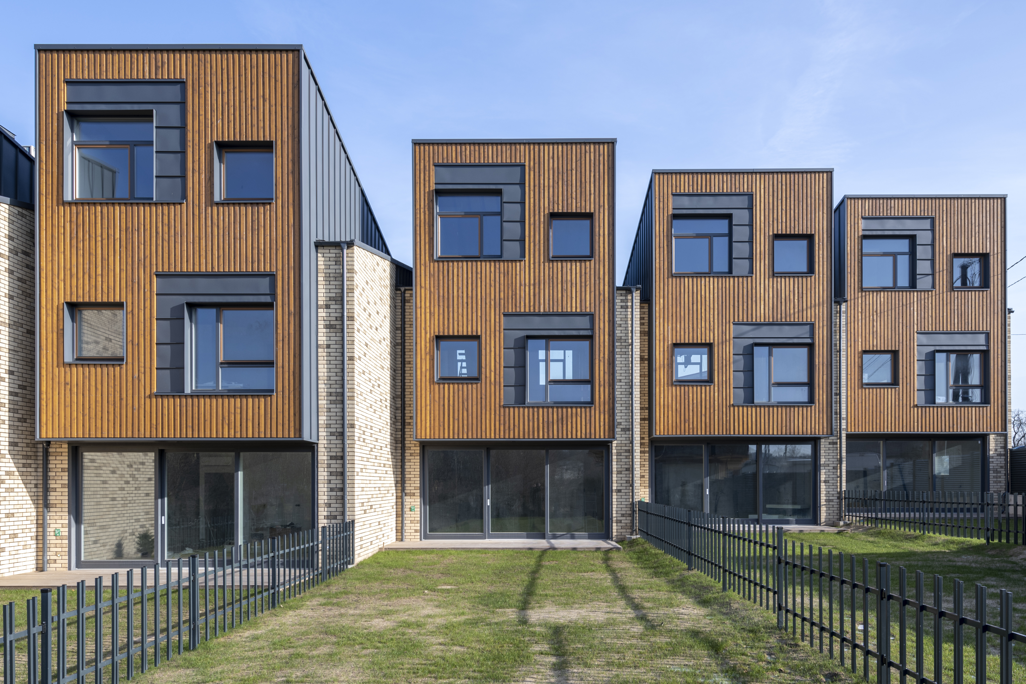 Semi-detached Houses by Devyni Architektai - Architizer