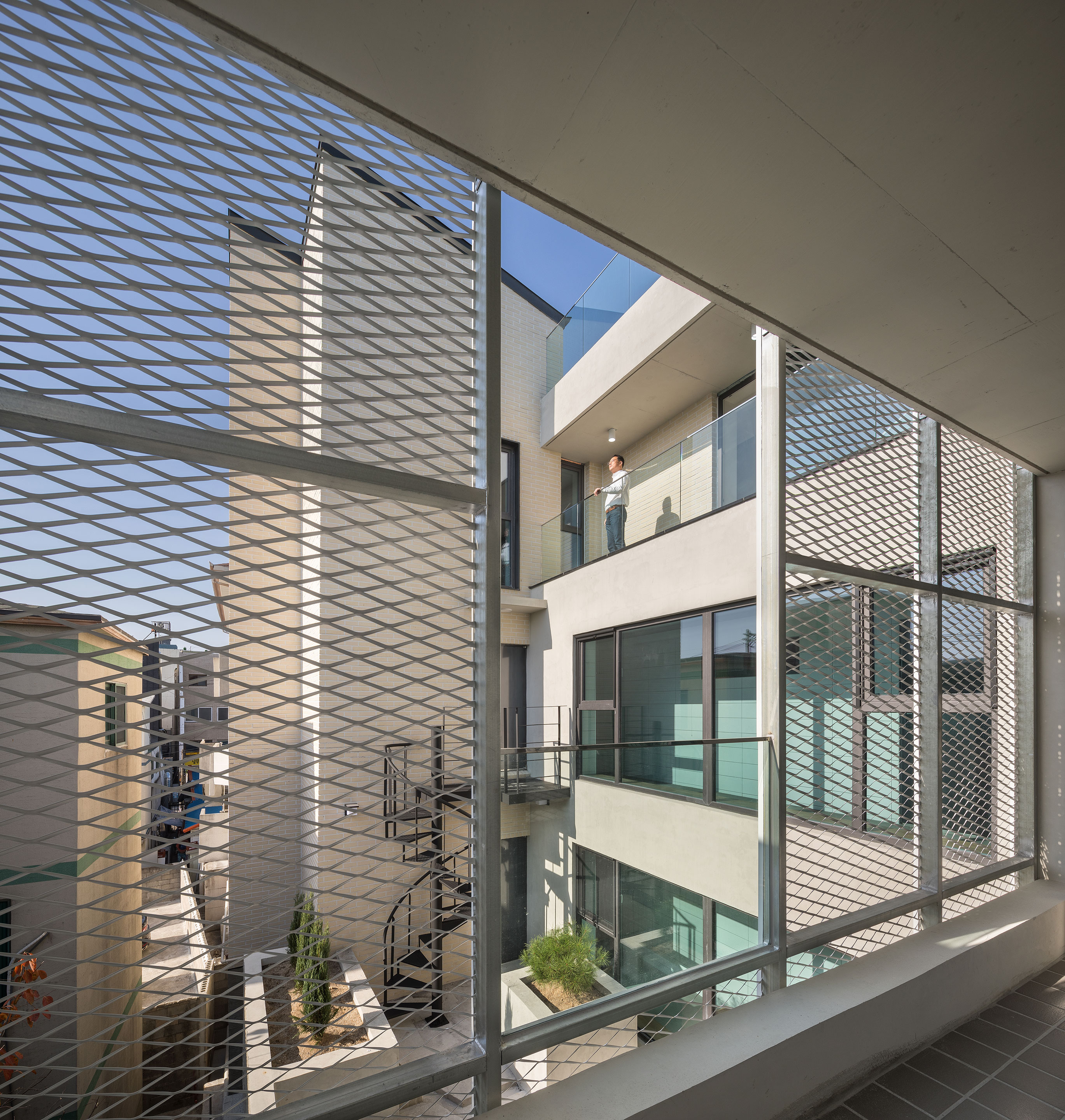 Dandelion Courtyard Building by Architecture Studio YEIN - Architizer