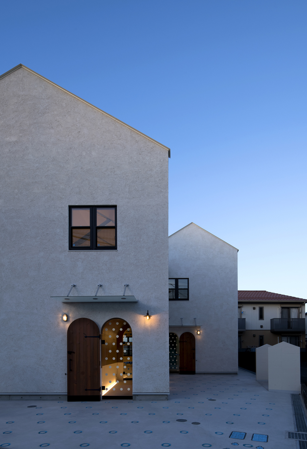 Two Stories building by Organic Design Inc. - Architizer