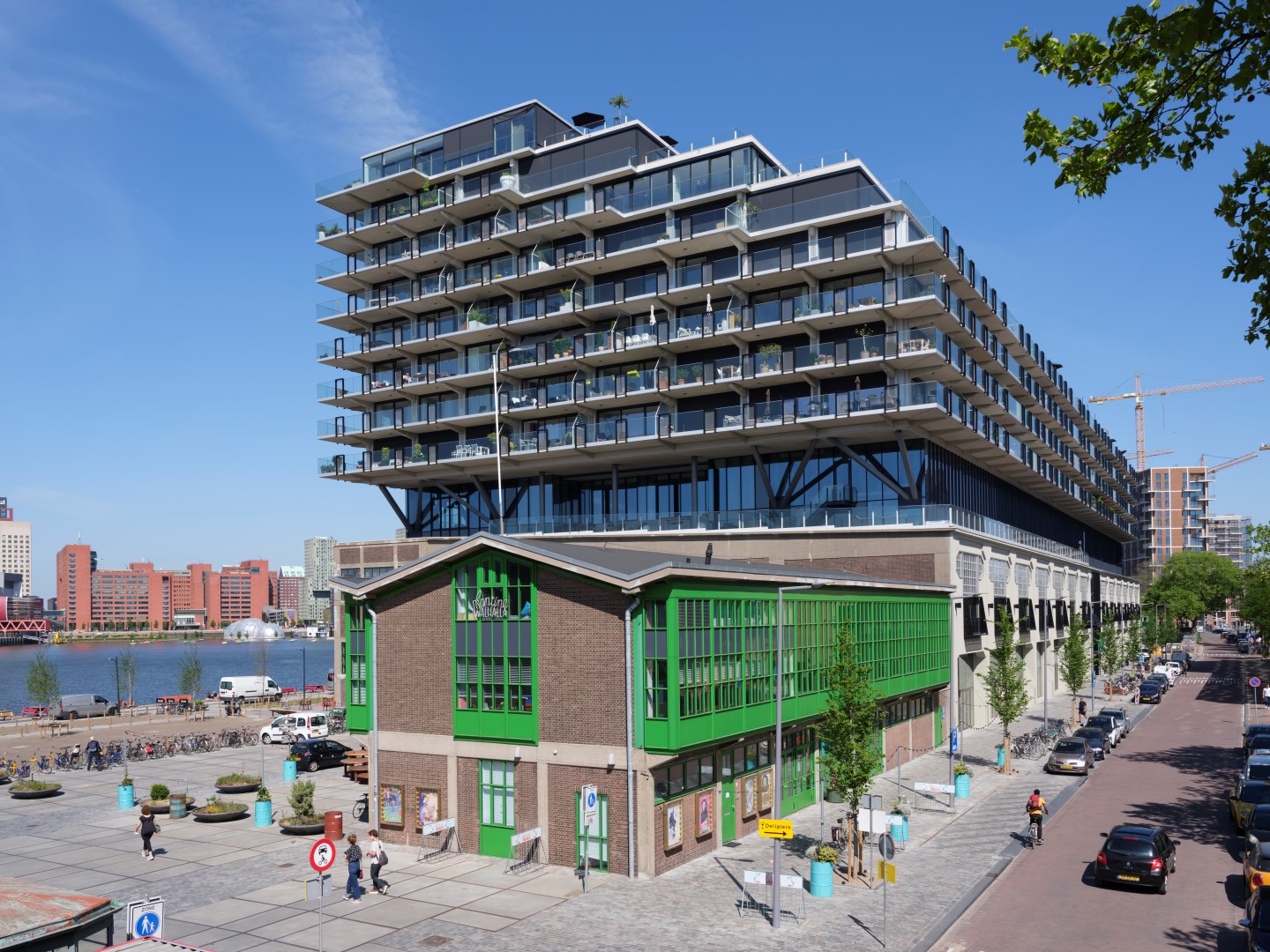 Fenix I, loft apartments on top of a warehouse by Mei architects and ...