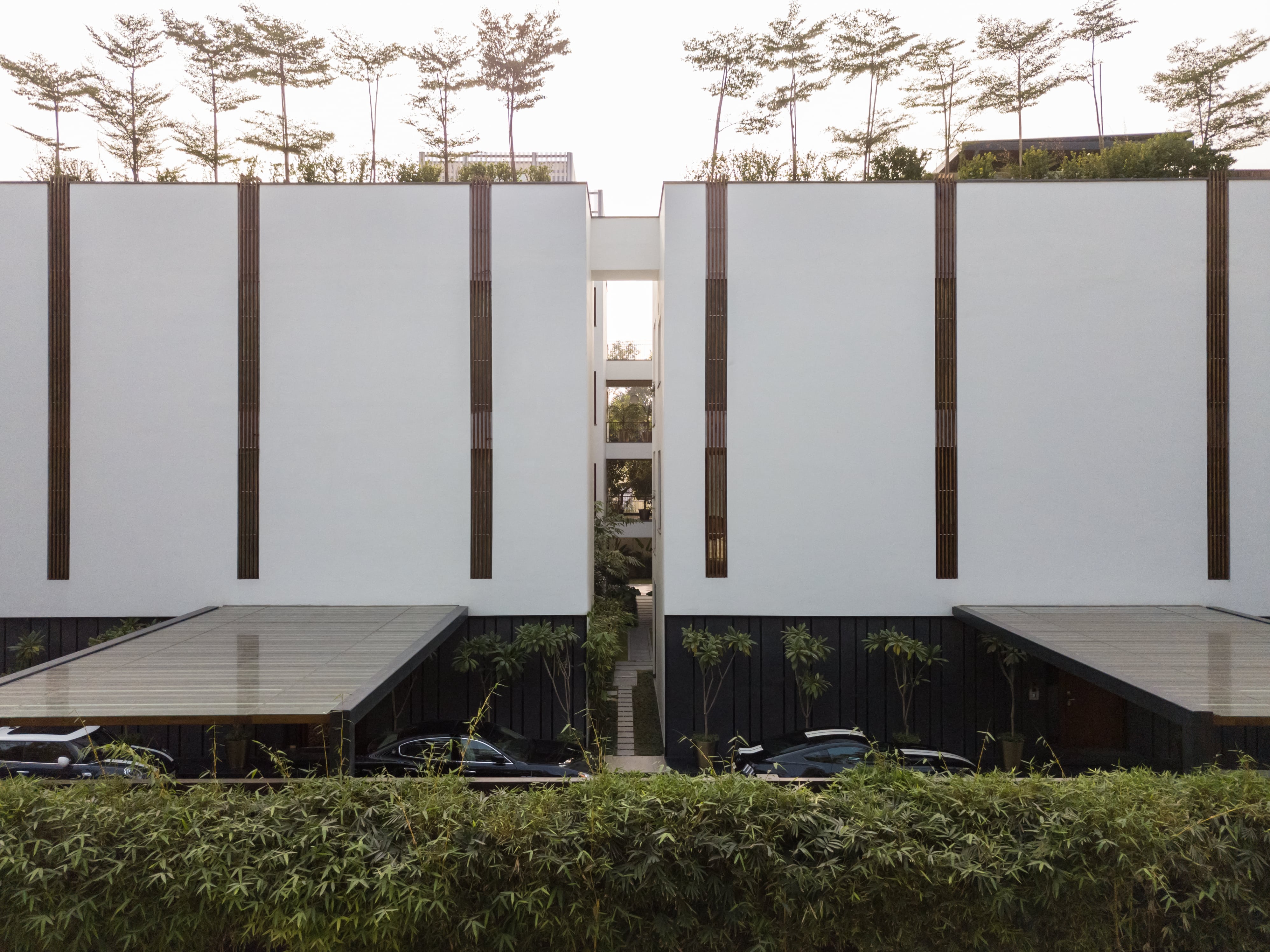 Twin Cubes and A Court by Studio Lotus - Architizer