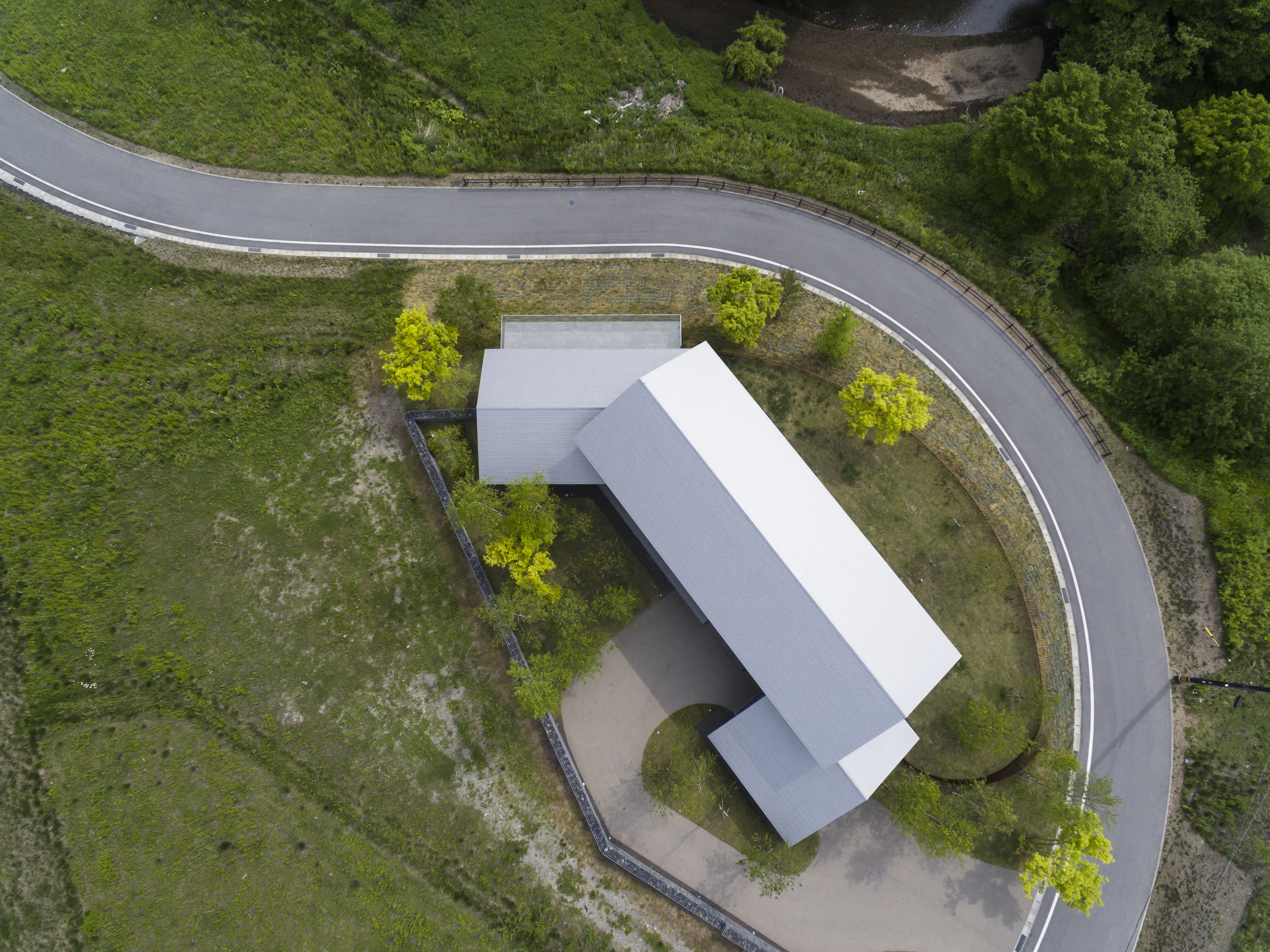 Asymmetric House by KIAS - Architizer