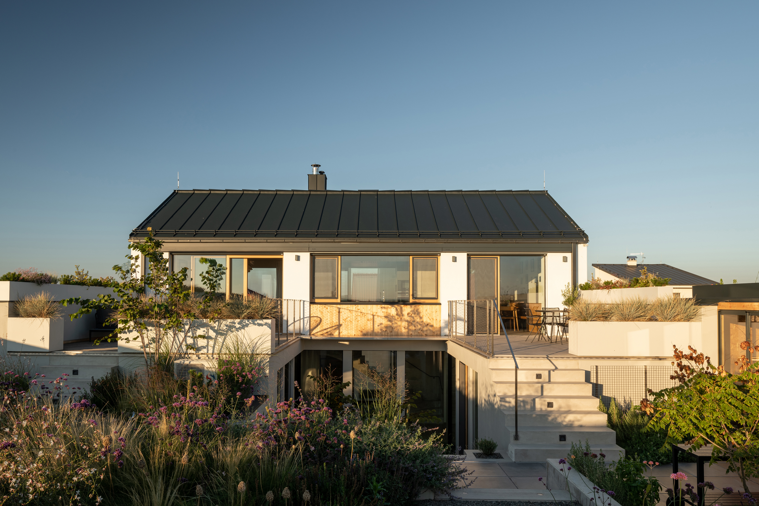 Family House With Atrium by SENAA architekti - Architizer