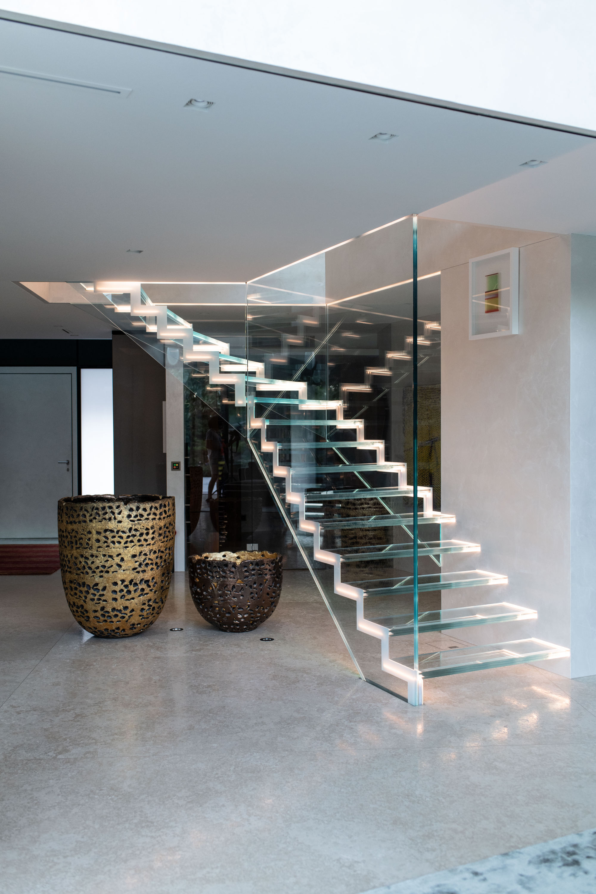 All glass stair with LED in Switzerland by Siller Stairs - Architizer