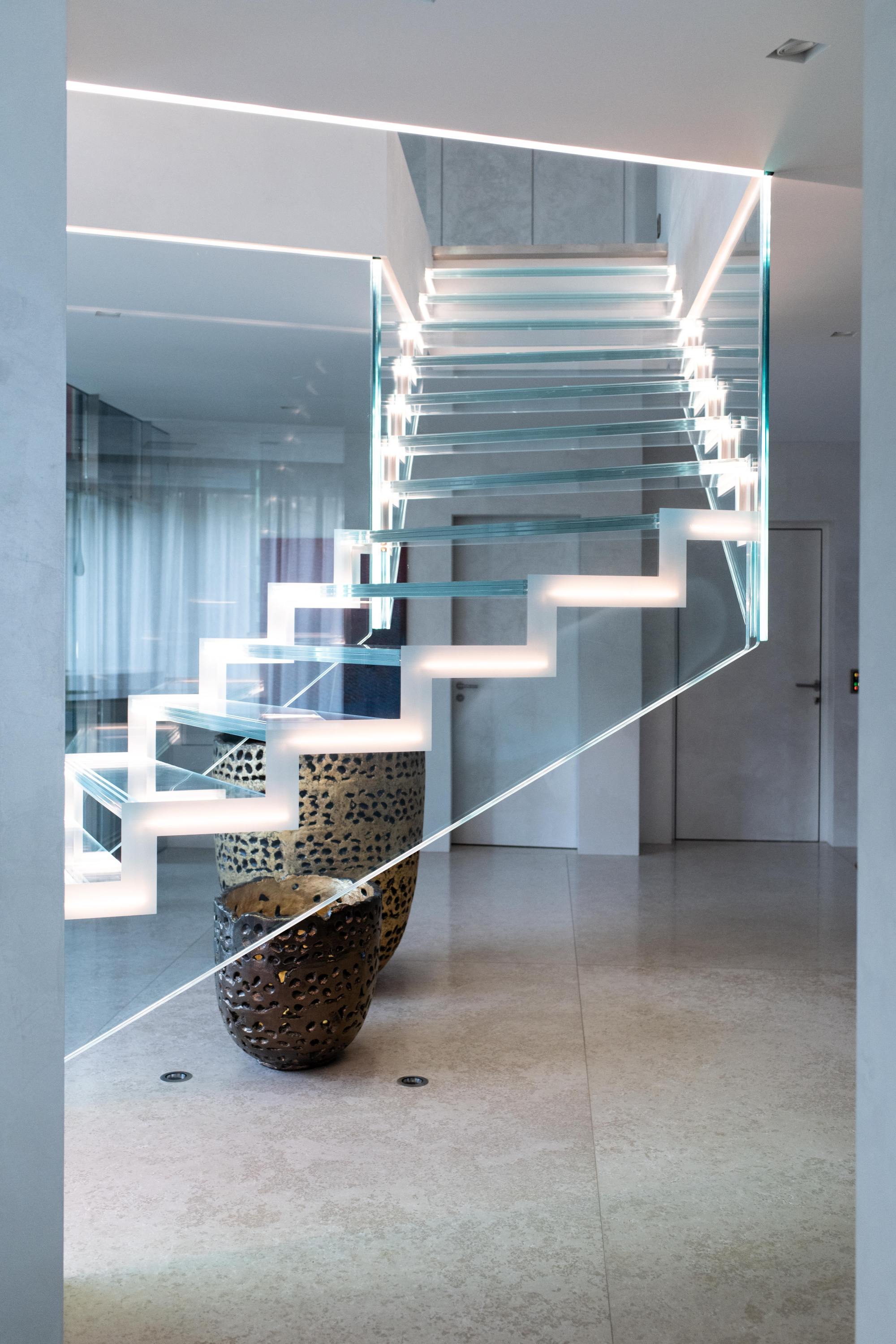 All glass stair with LED in Switzerland by Siller Stairs - Architizer