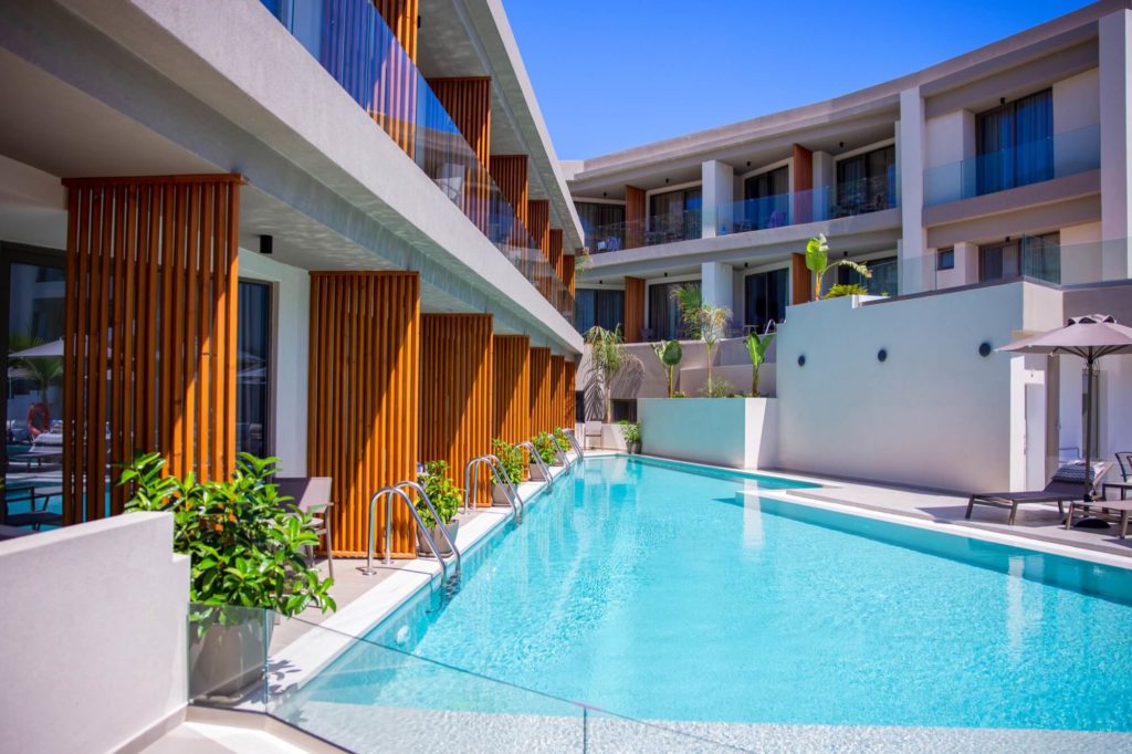 Hotel renovation & new wing extension by darc architecture & interior ...